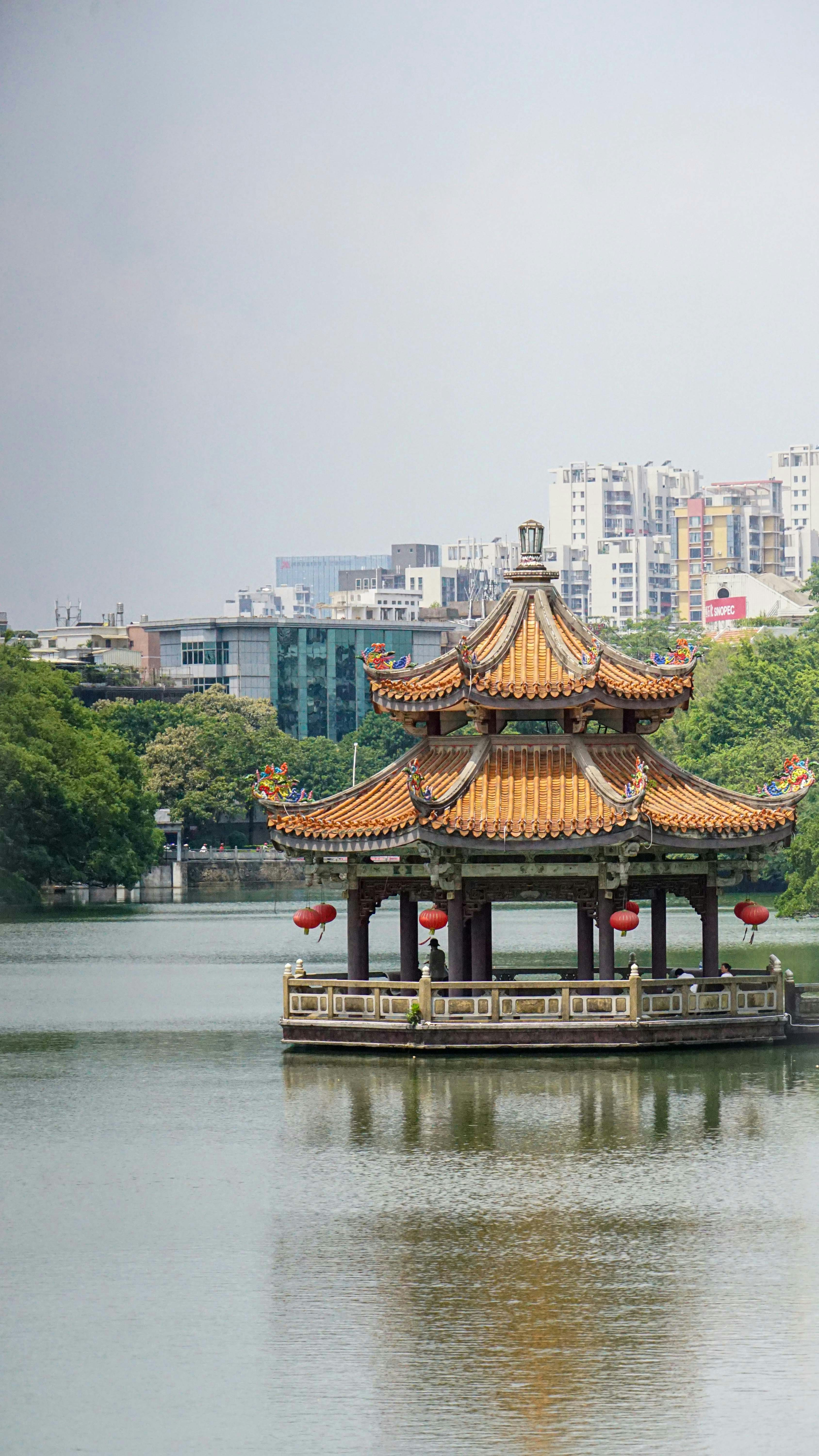 Lakeside Pagoda: Lanterns, Water, and the Quiet Pulse of the City
