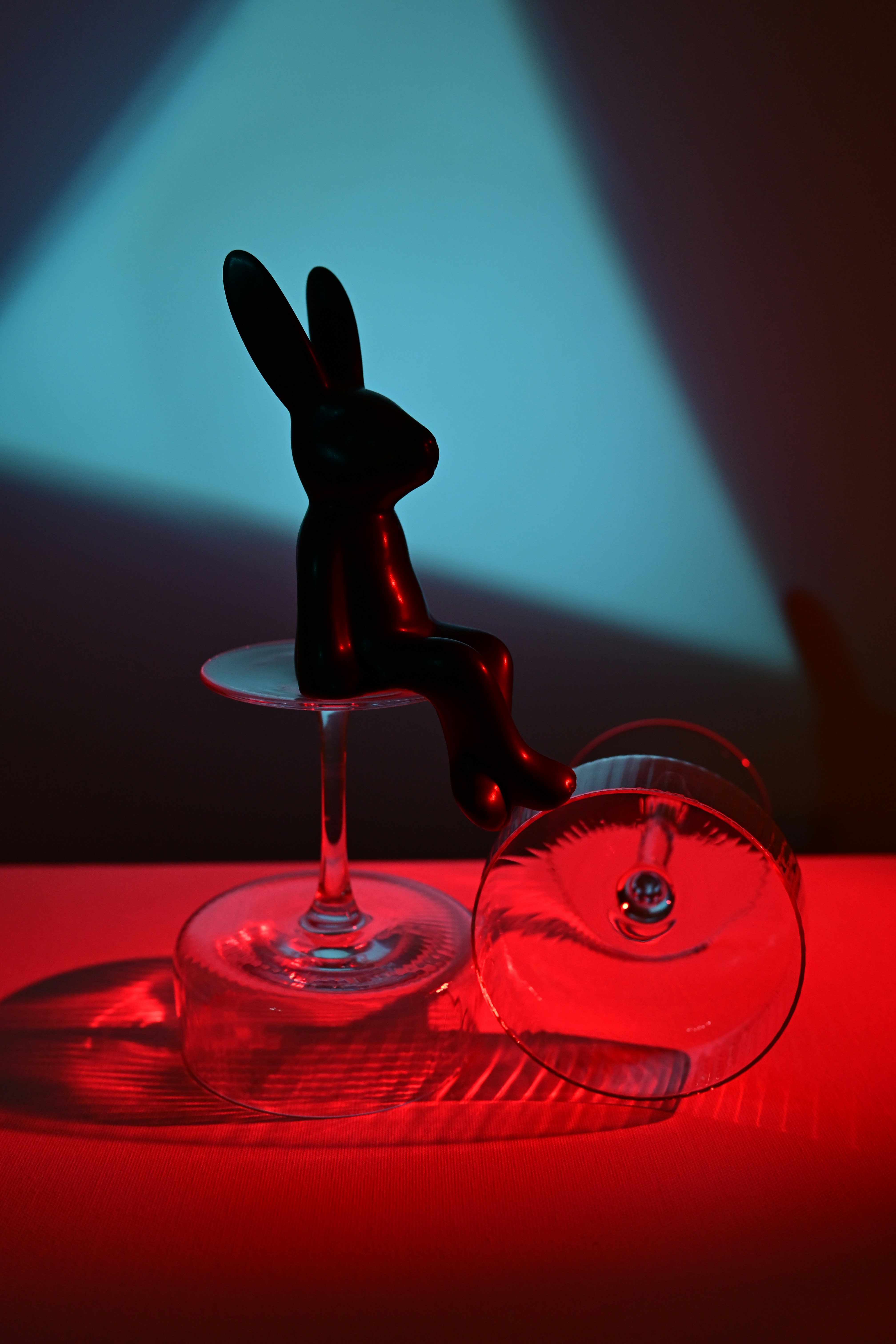 Crimson Glow on a Glass Bunny: a Neon Still-Life