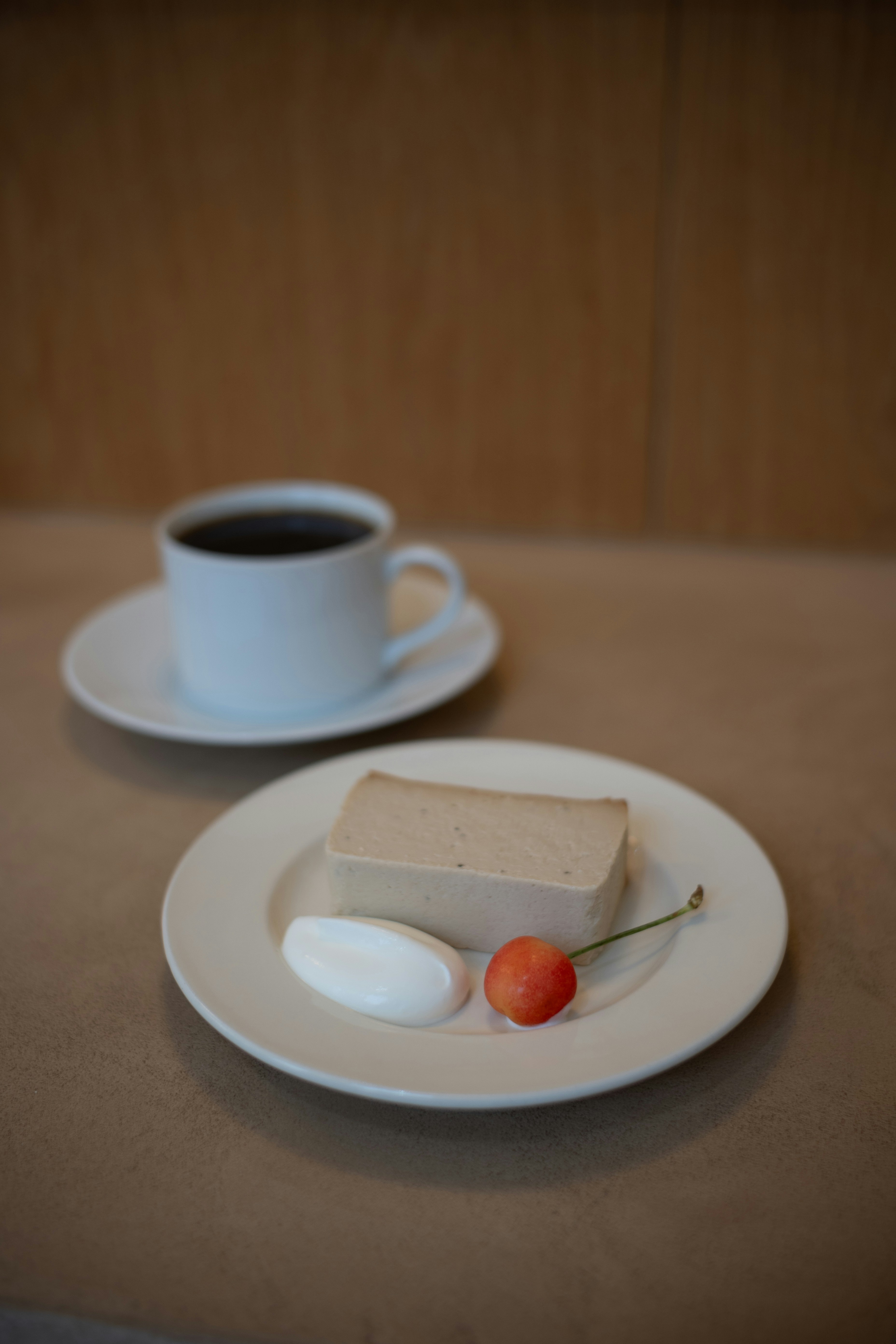 Coffee and cake await a sweet treat.