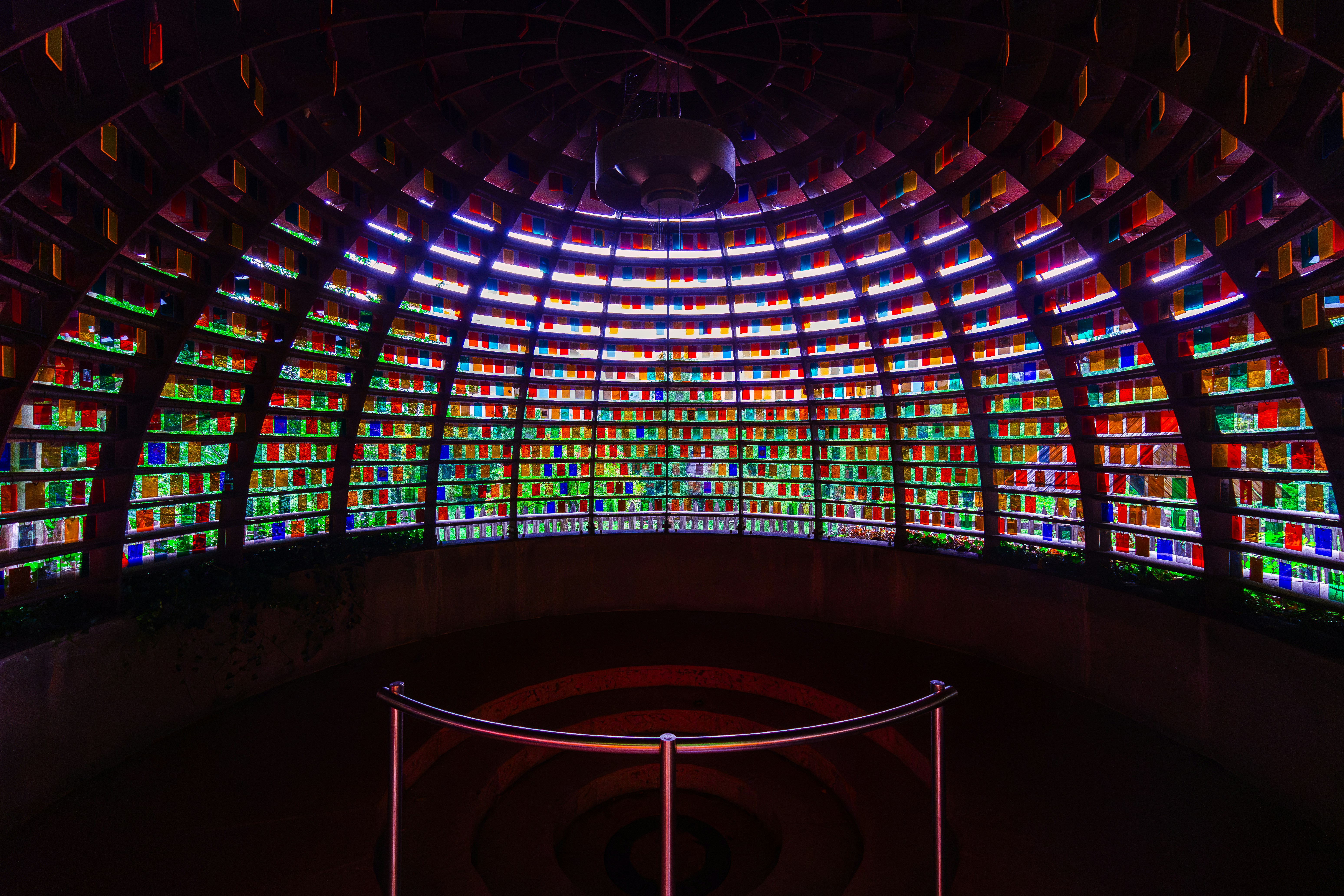 Chromatic Dome: A Rainbow Ring Enclosing a Quiet Gallery