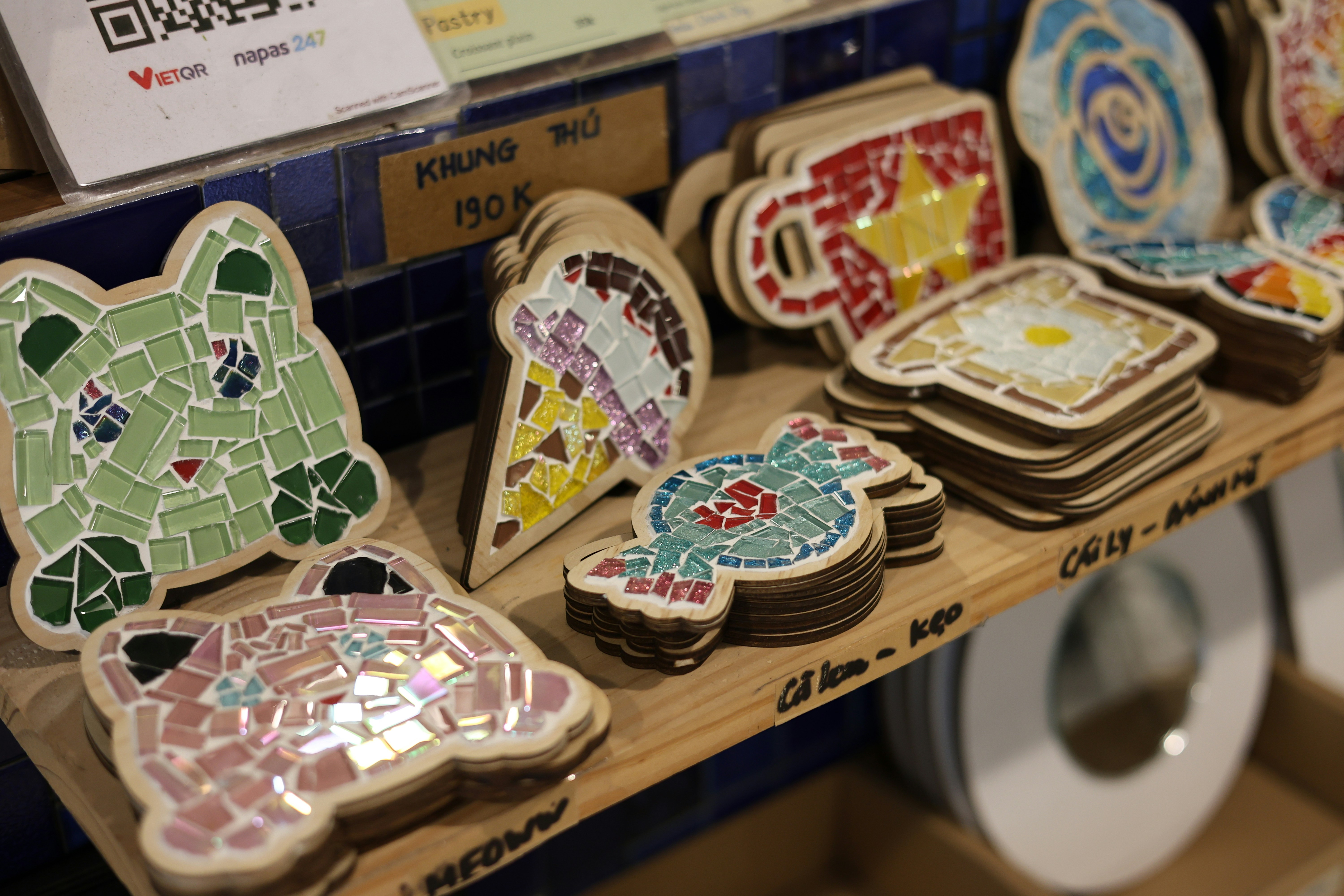 Tiled Heart Mosaics on a Wooden Shelf