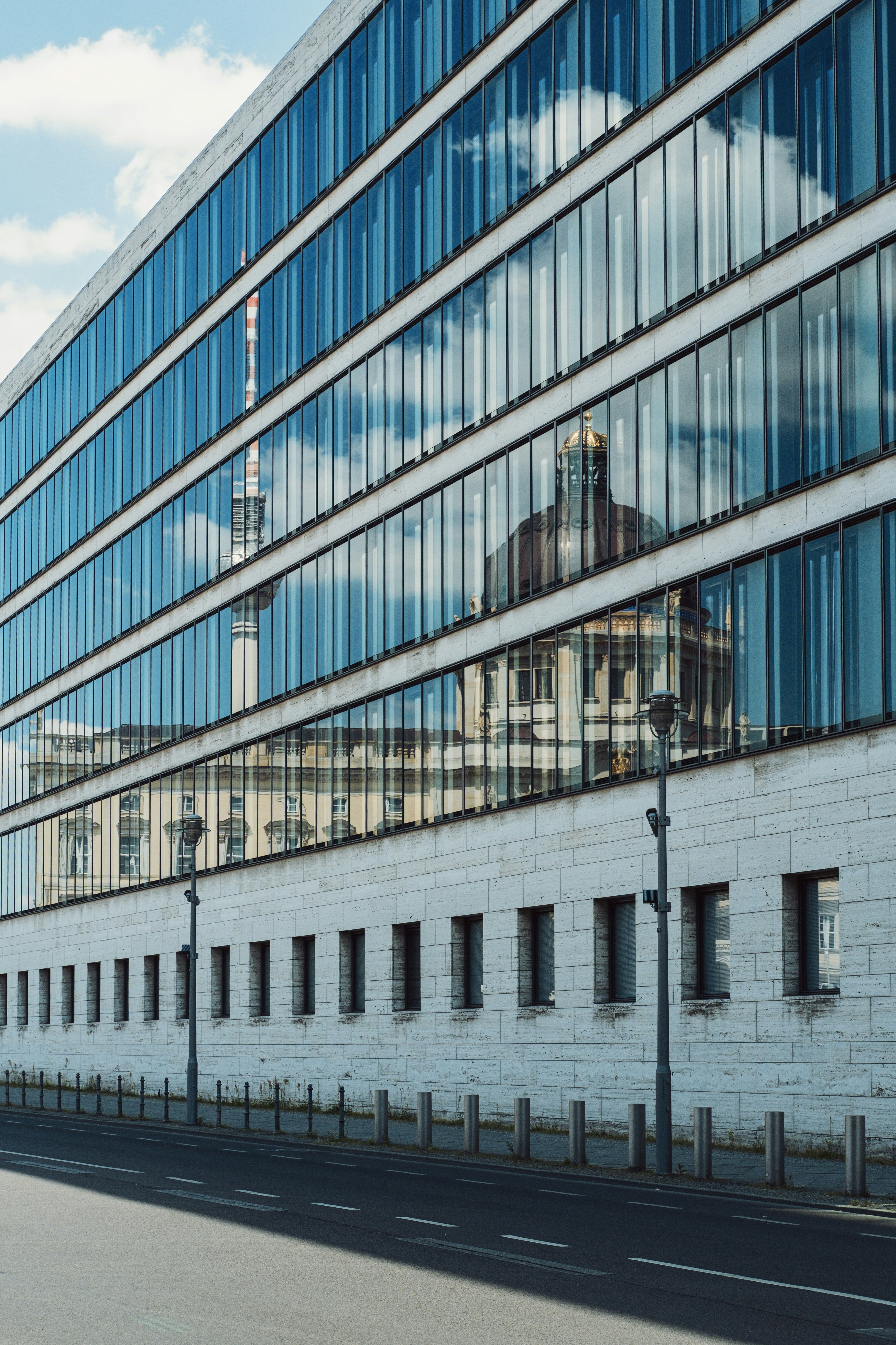 Dome in the Glass: Reflections Across a Modern Facade