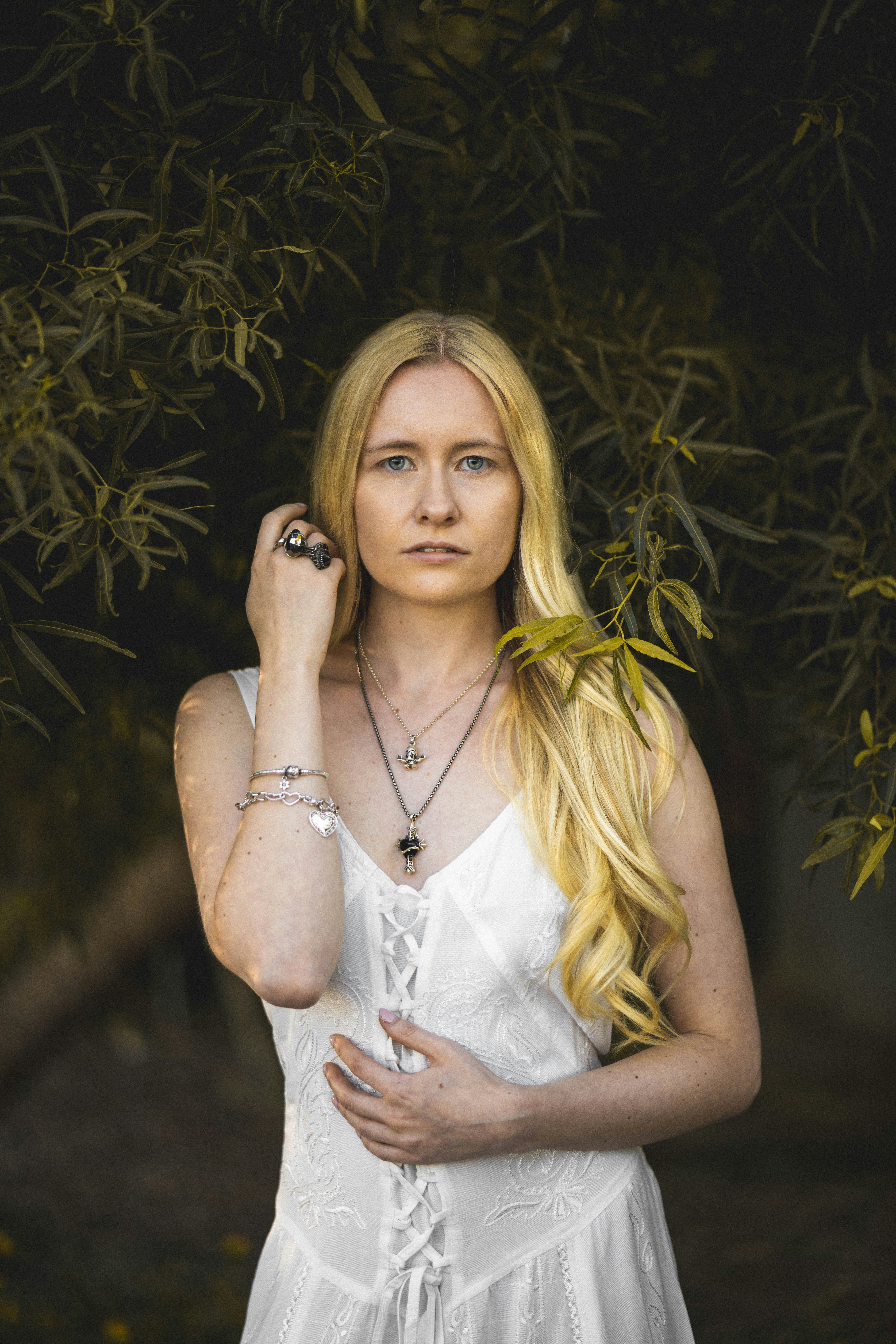 Caitlyn (2018) Follow me on Instagram at instagram.com/dustindavidchu | A blonde woman poses in front of foliage.
