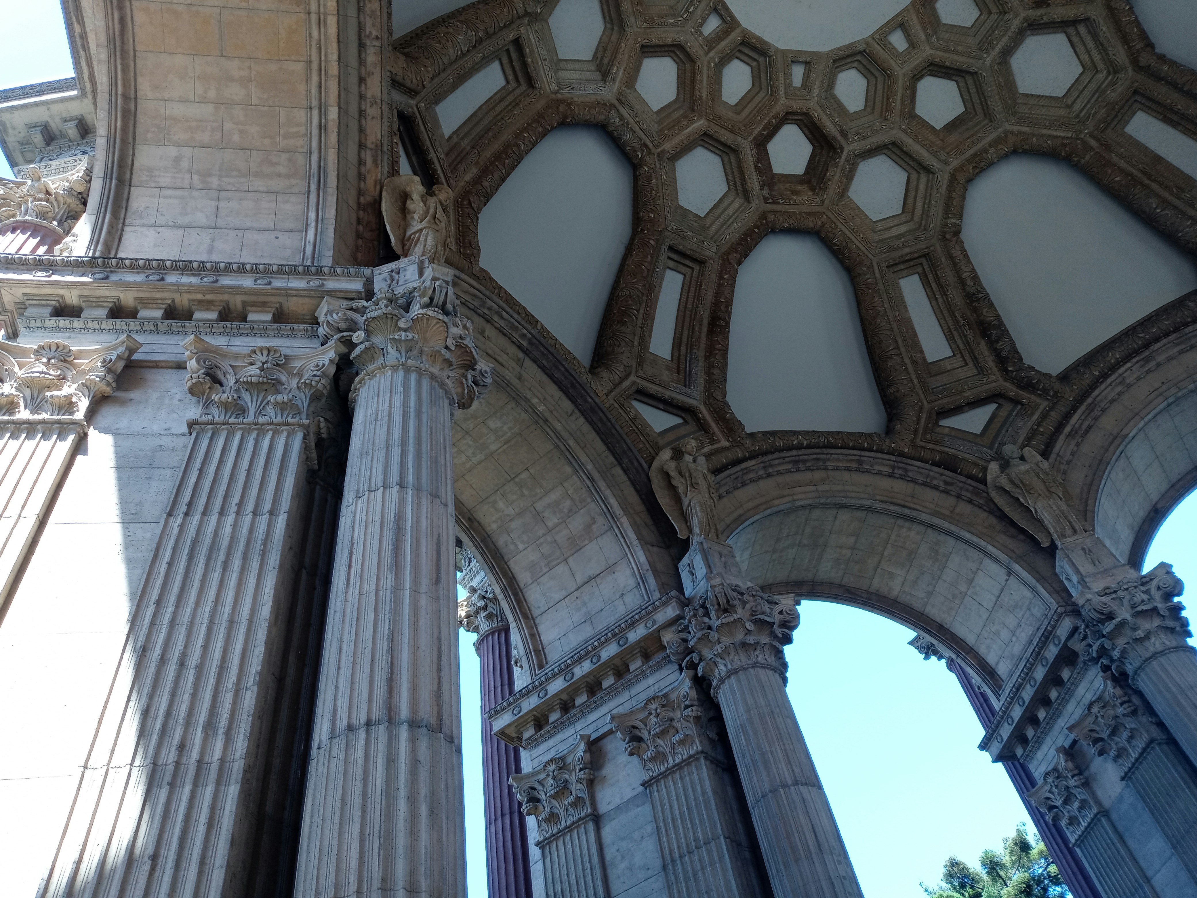 Palace of Fine Arts | Ornate columns and ceiling of an archway are featured.