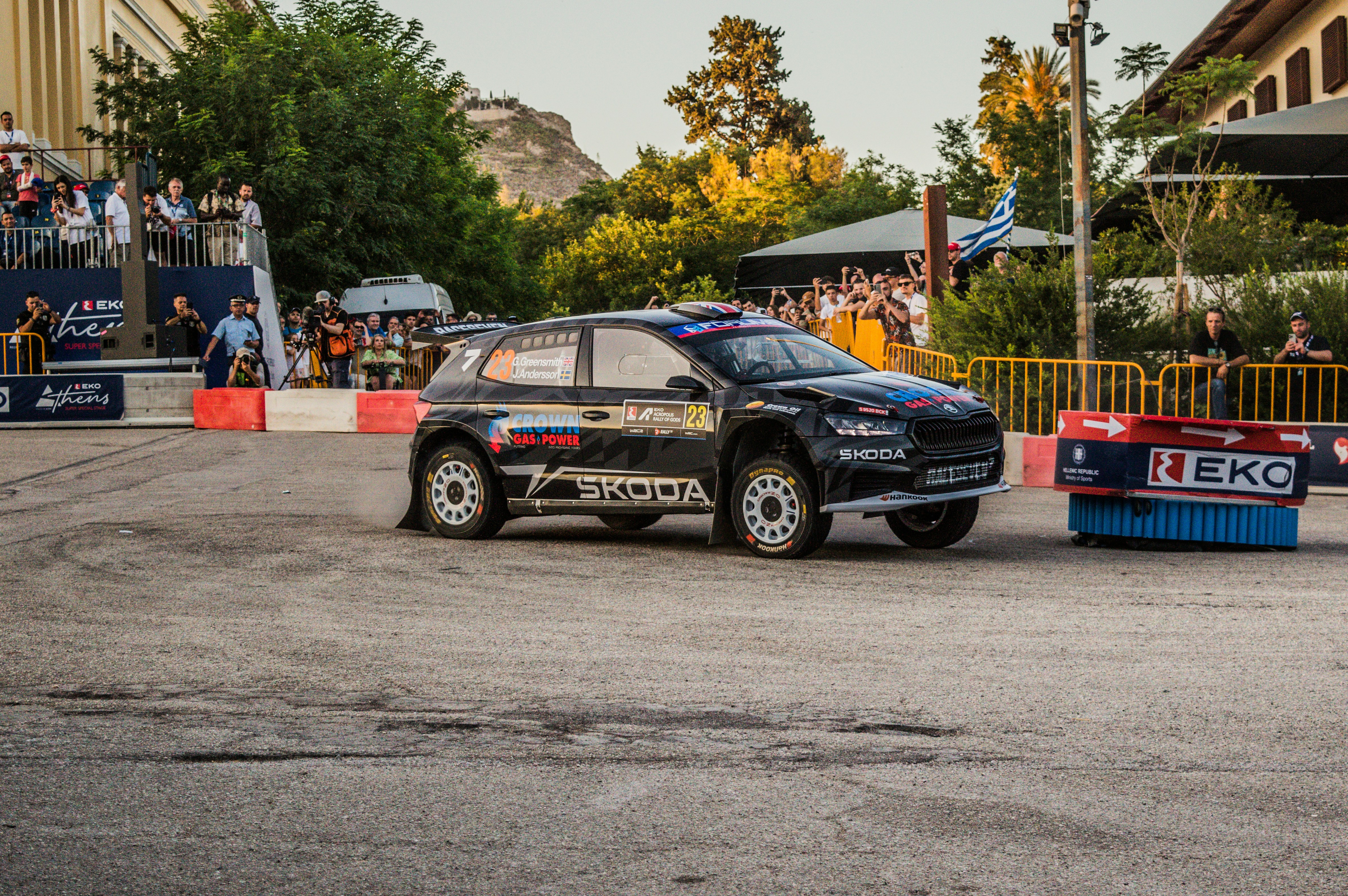 A rally car speeds around a race track. photo – Free Greece Image on ...