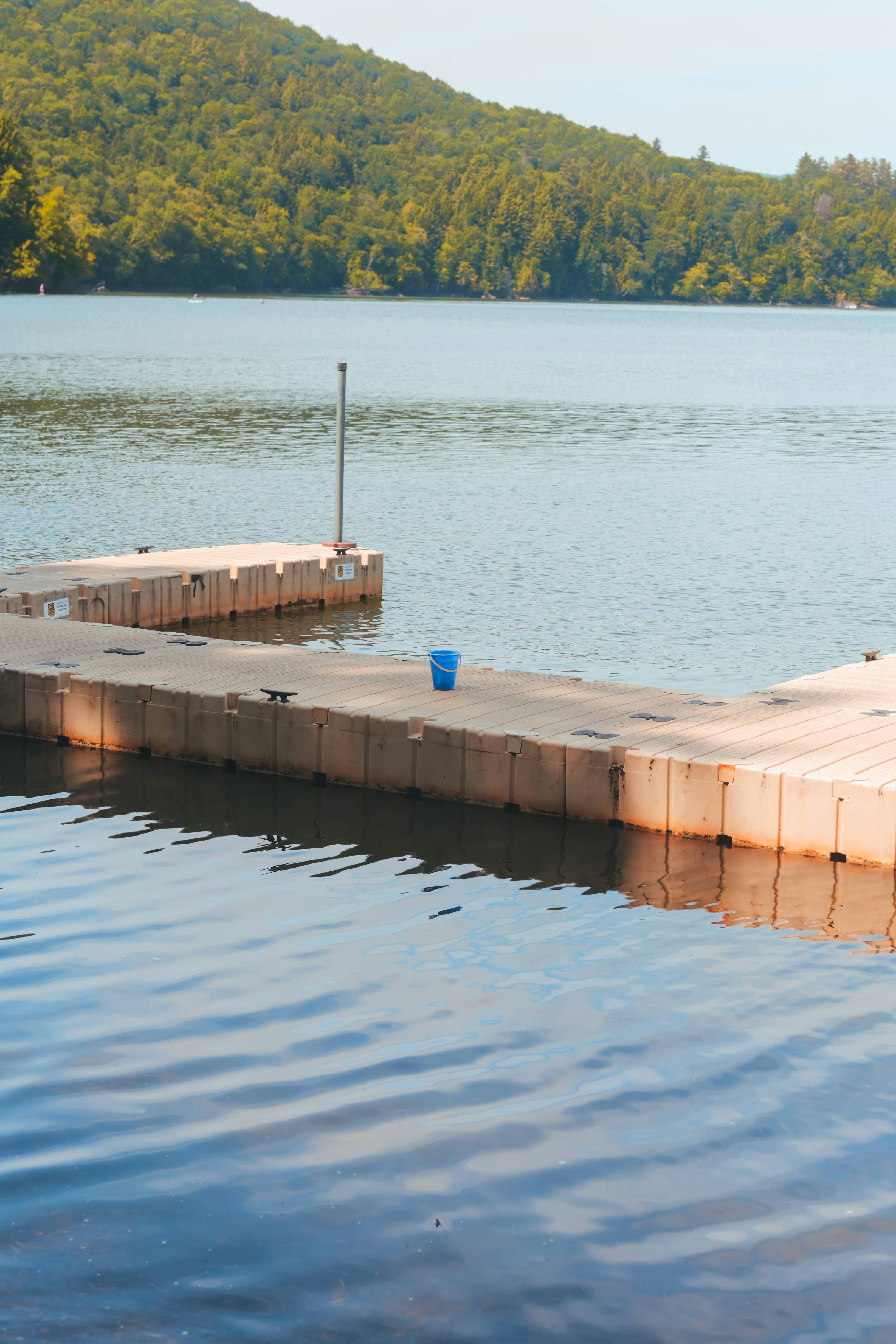 Blue Beacon on a Lakefront Dock