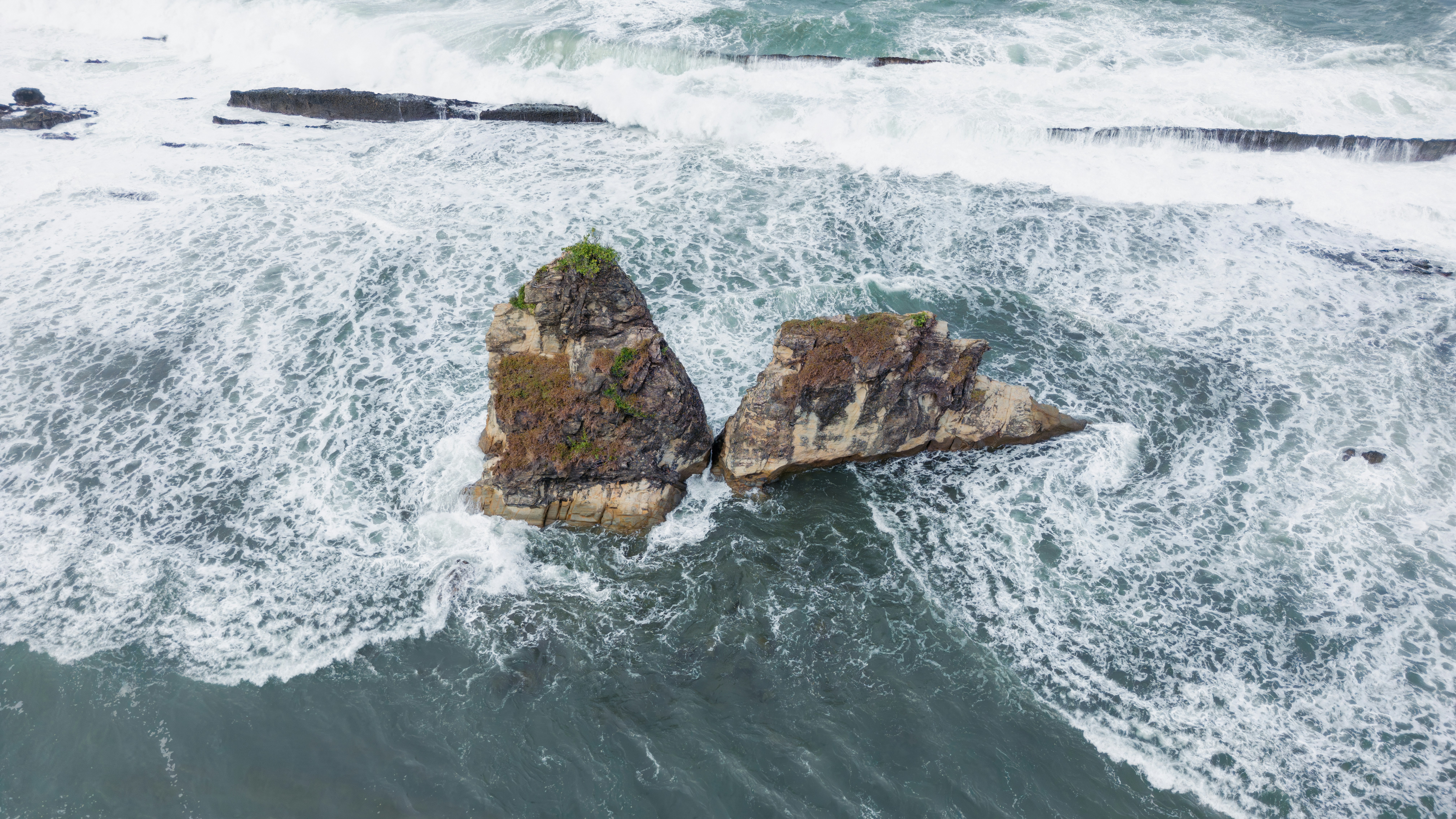 Resilient Rocks Amidst the Roaring Waves