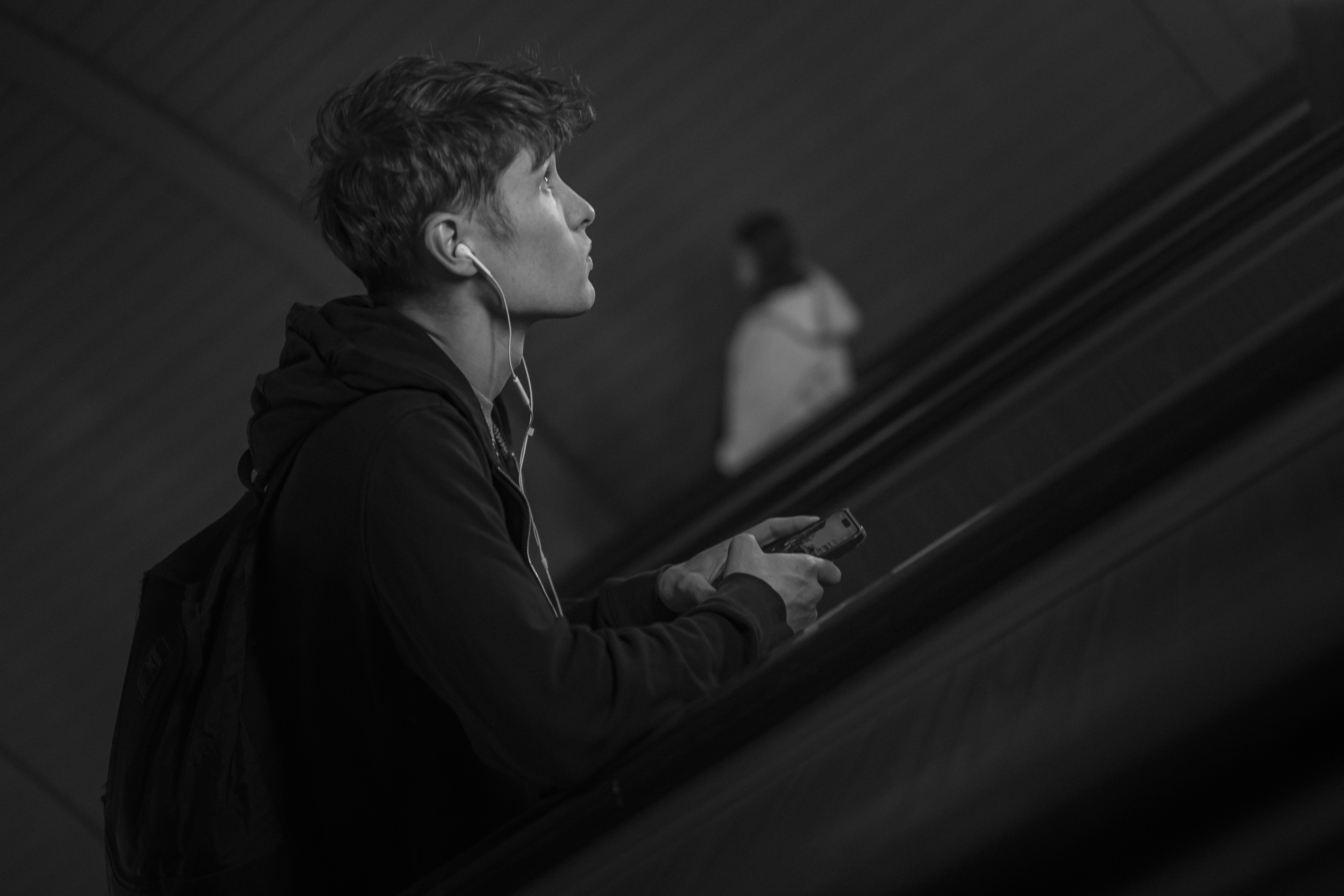 Mono Ascent: A Quiet Moment on an Escalator