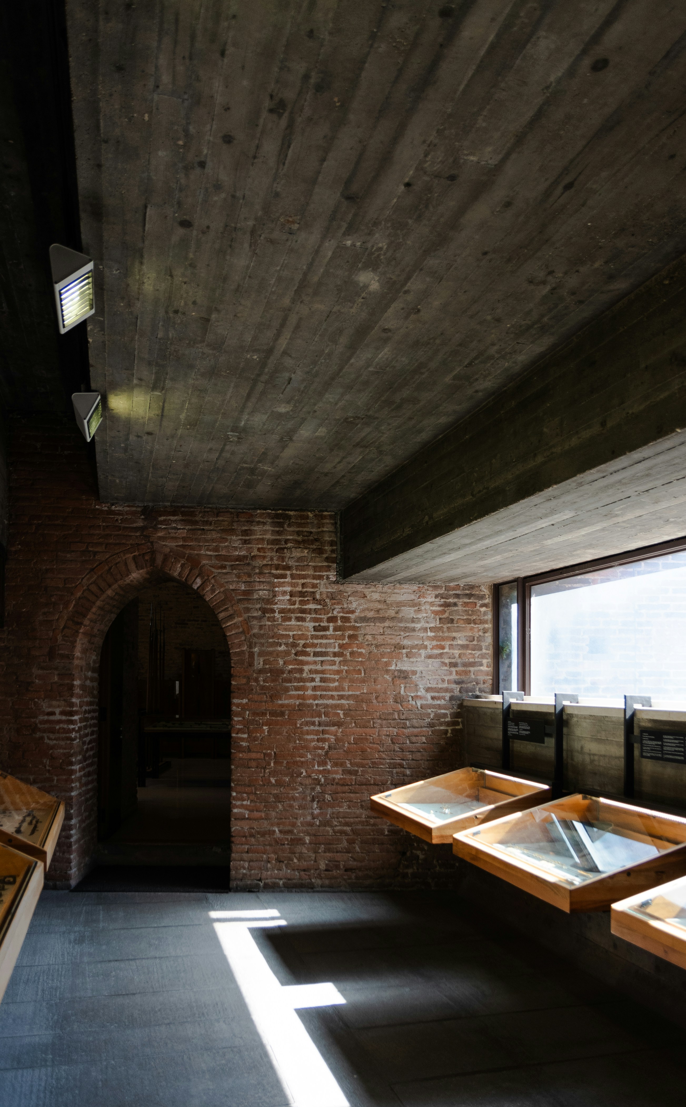 Archway Light: A Quiet Corridor of Brick and Glass