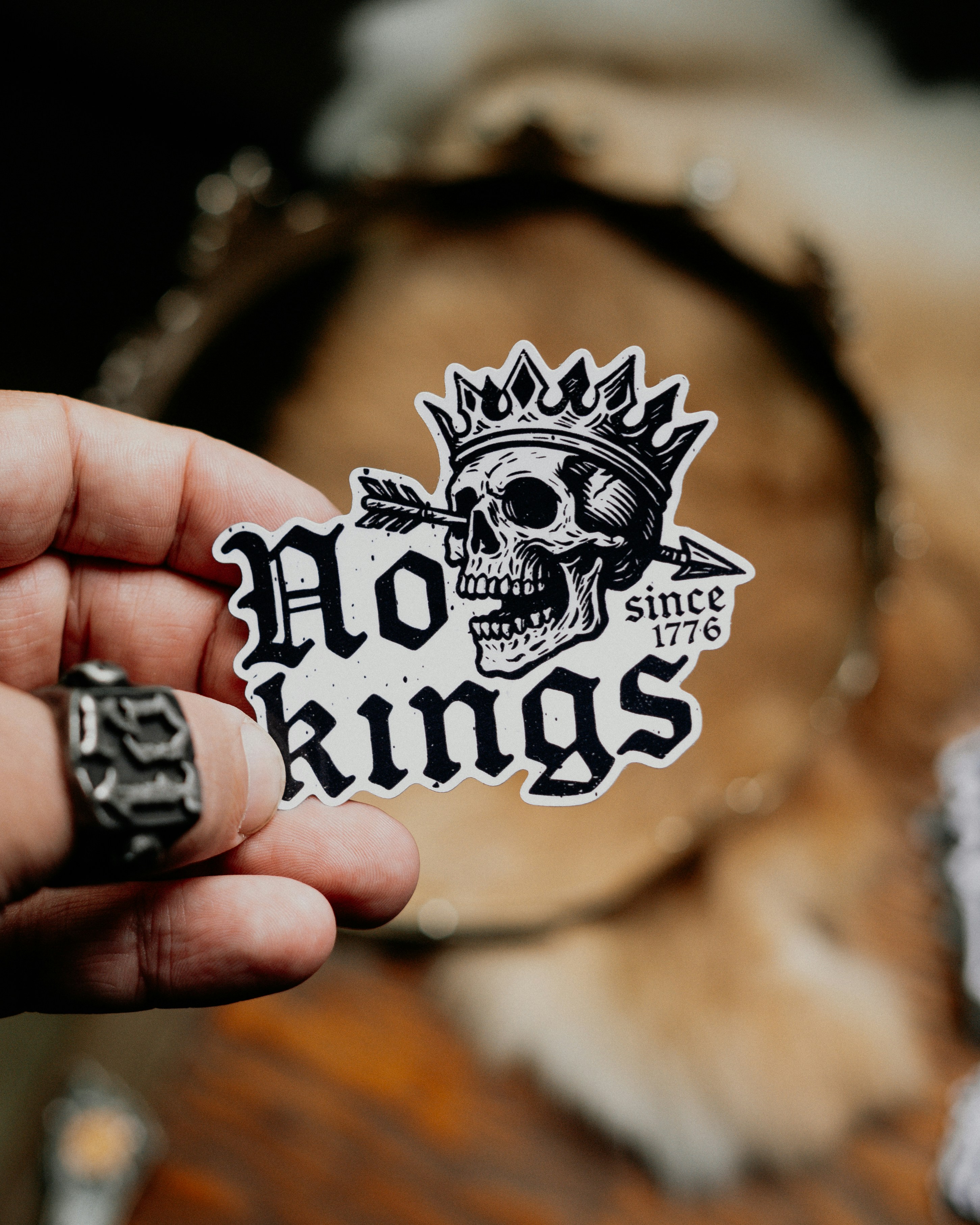 A "no kings" sticker featuring a skull and crown. photo – Free Product ...