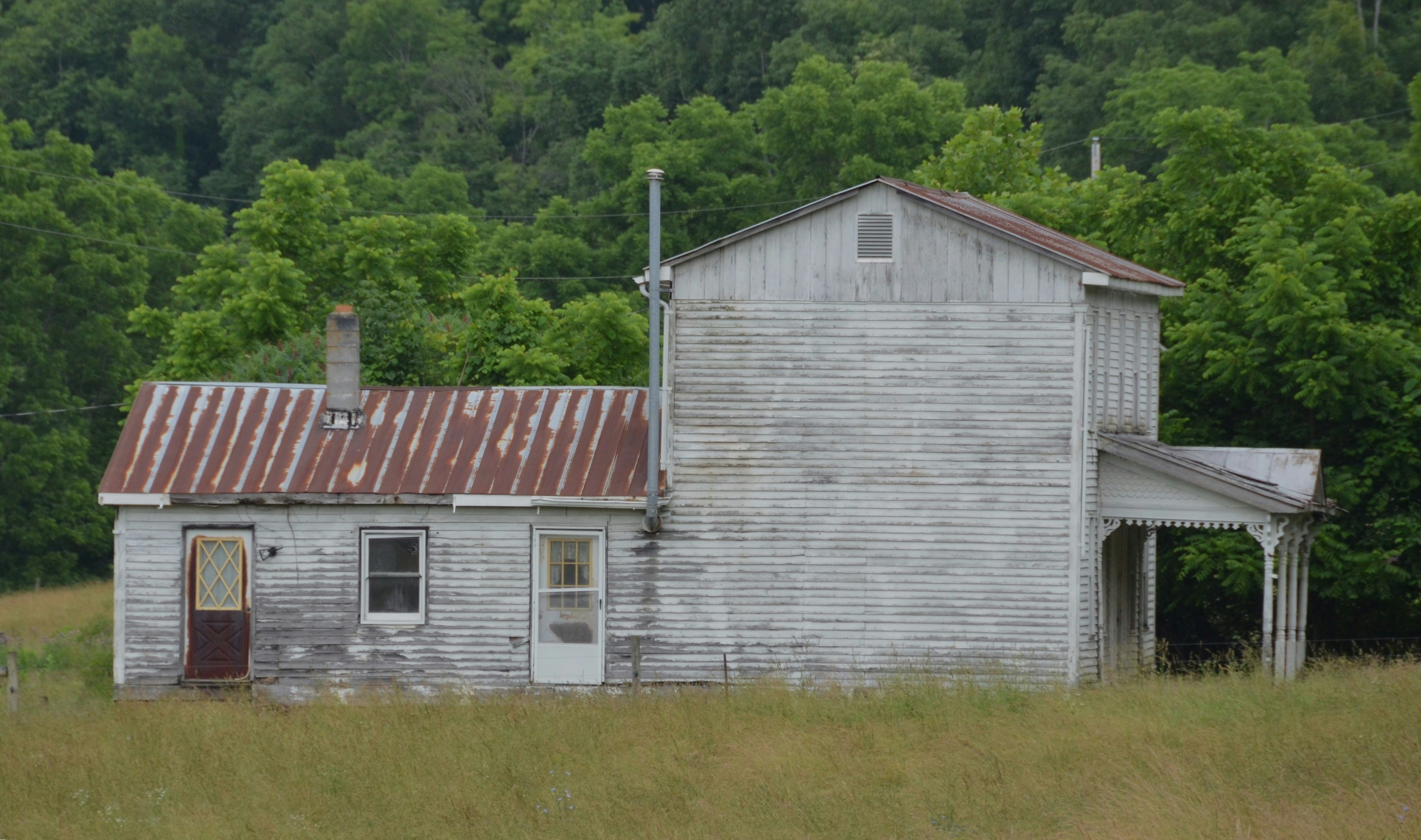 Whispers of Time: The Weathered Homestead