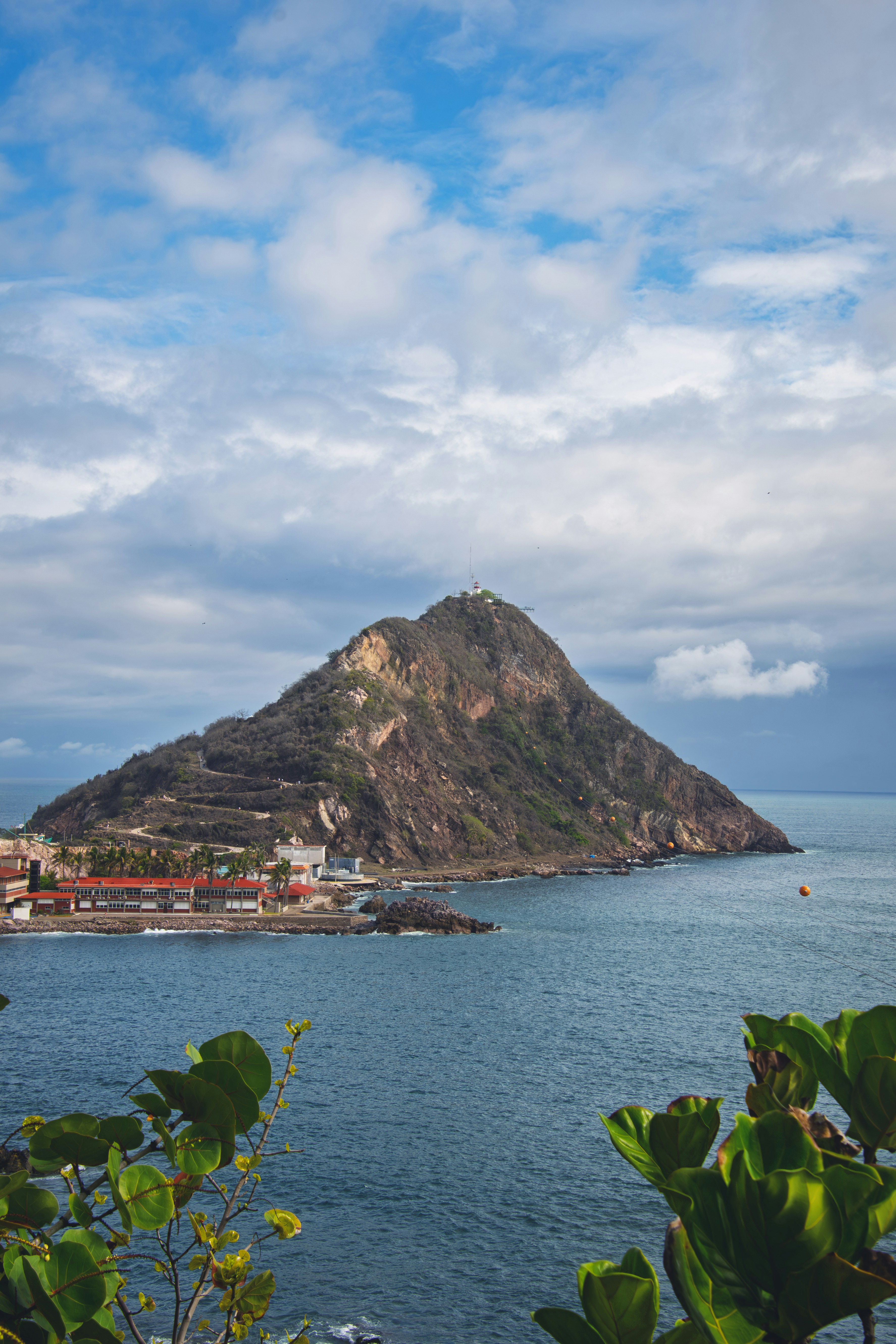 The Enigmatic Island Embraced by Waves