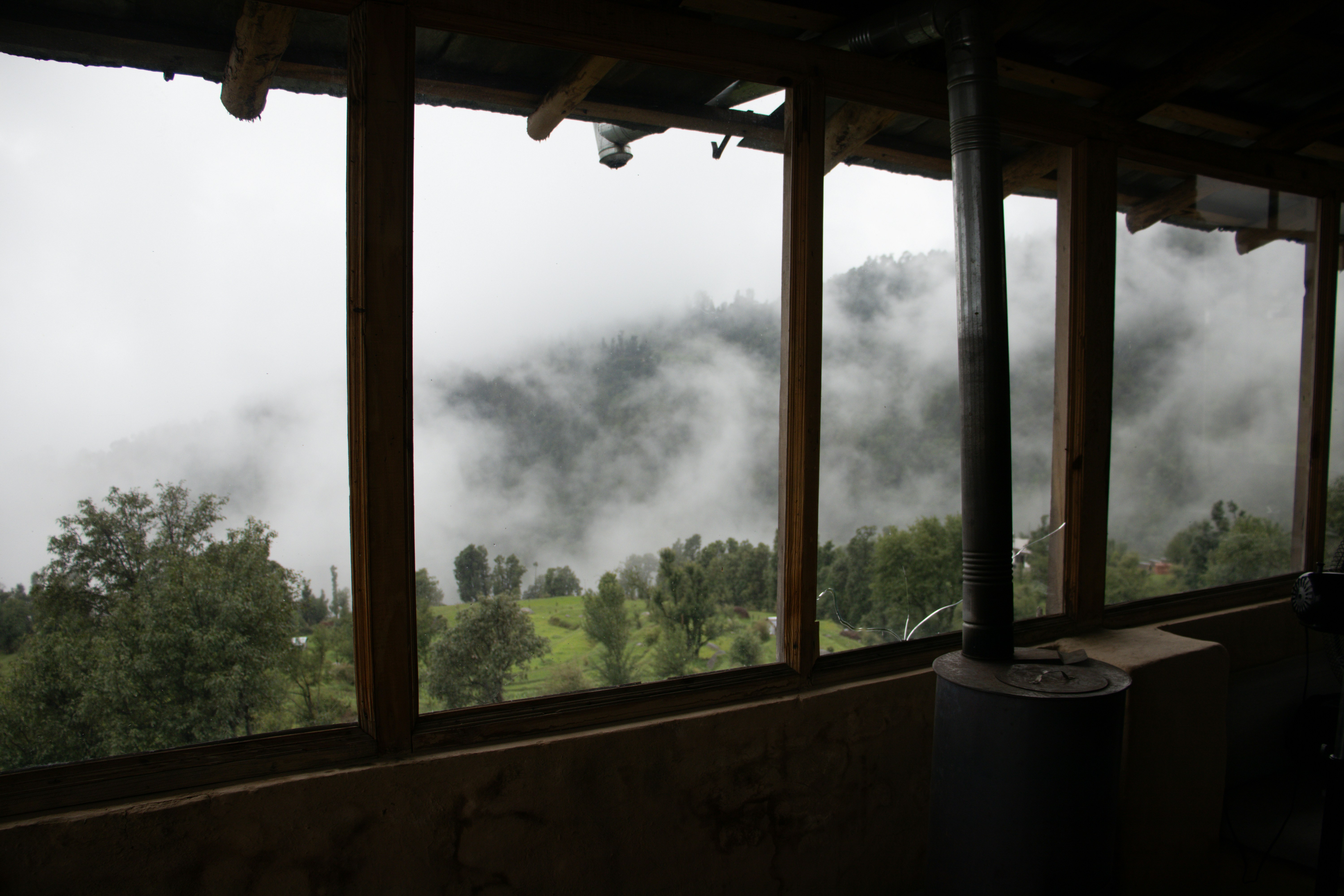 Veil of Mist Over Verdant Valleys