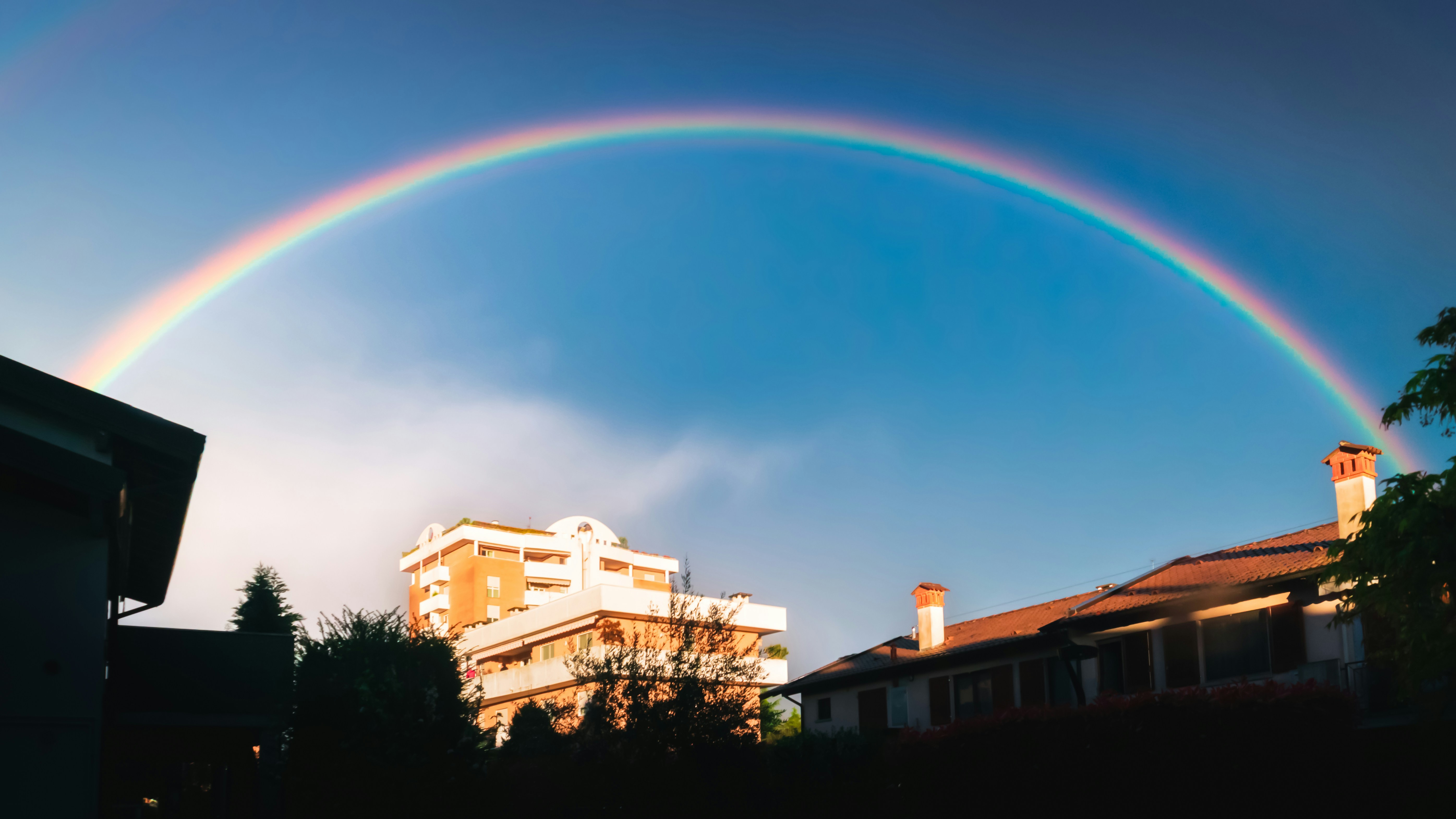 Arc of Promise: A Rainbow's Embrace