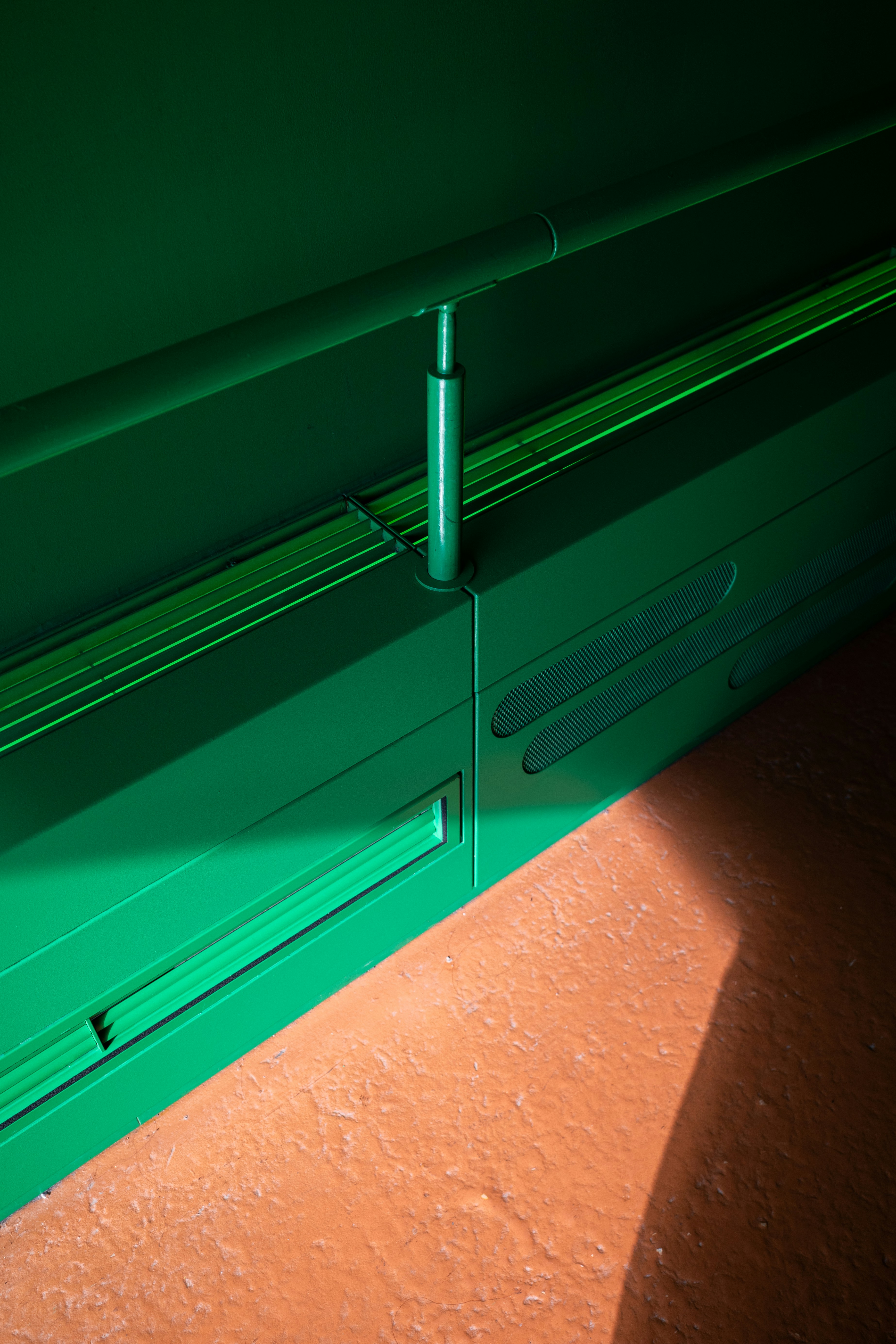 Emerald Corridor: Vertical Post in Neon Green Light