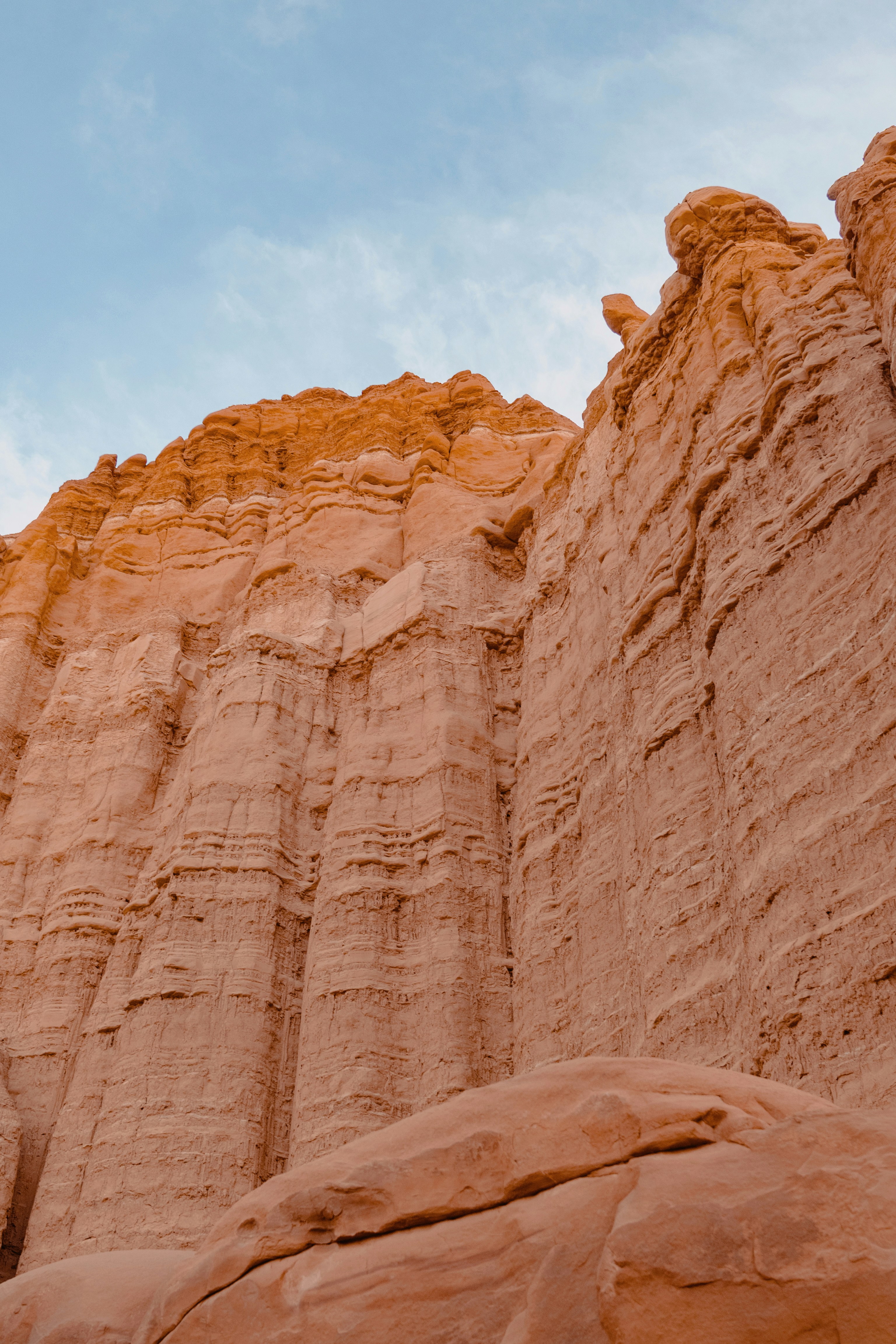 Red sandstone cliffs rise into a clear blue sky. photo – Free Wallpaper ...