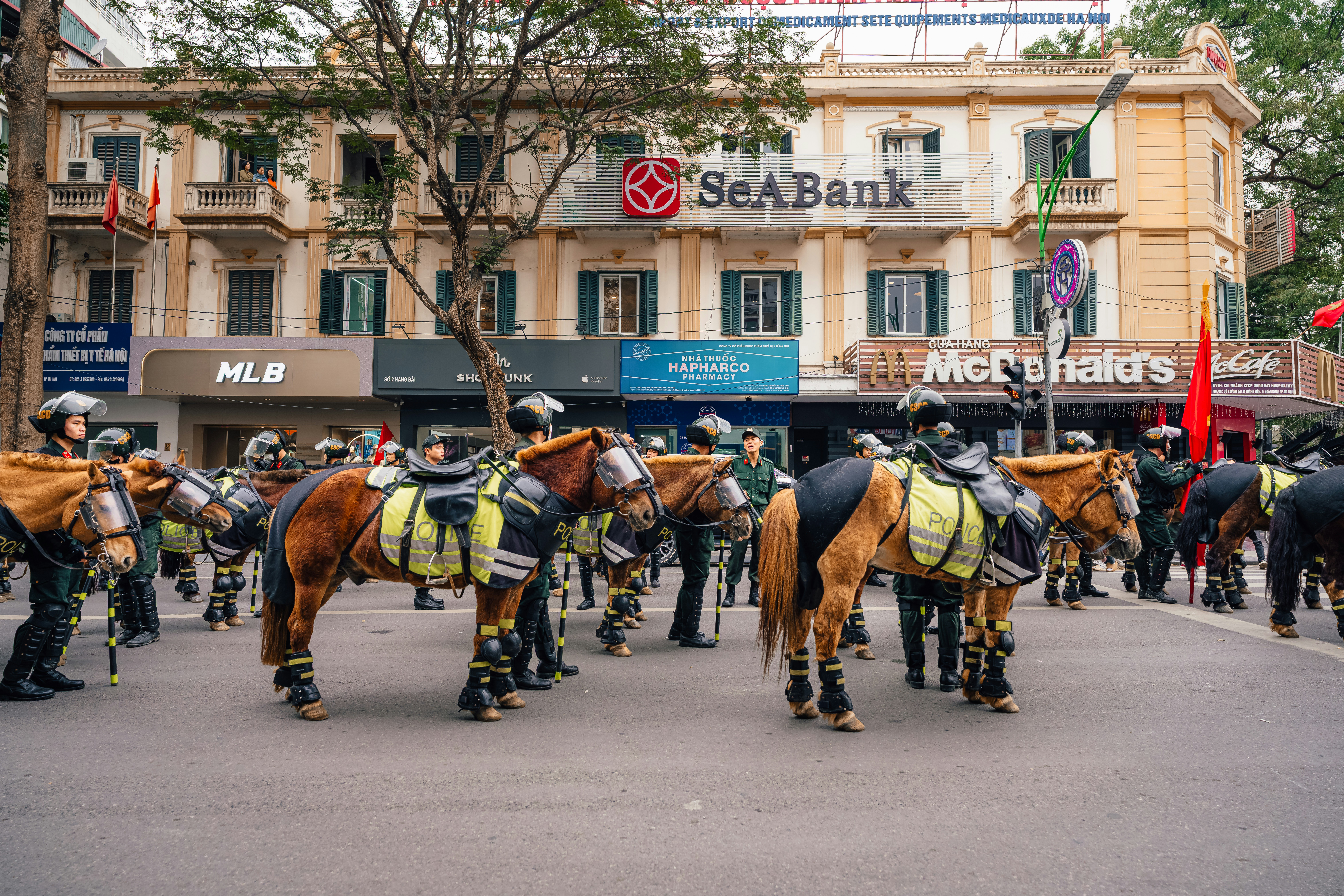 Equestrian Parade on a Bustling City Block