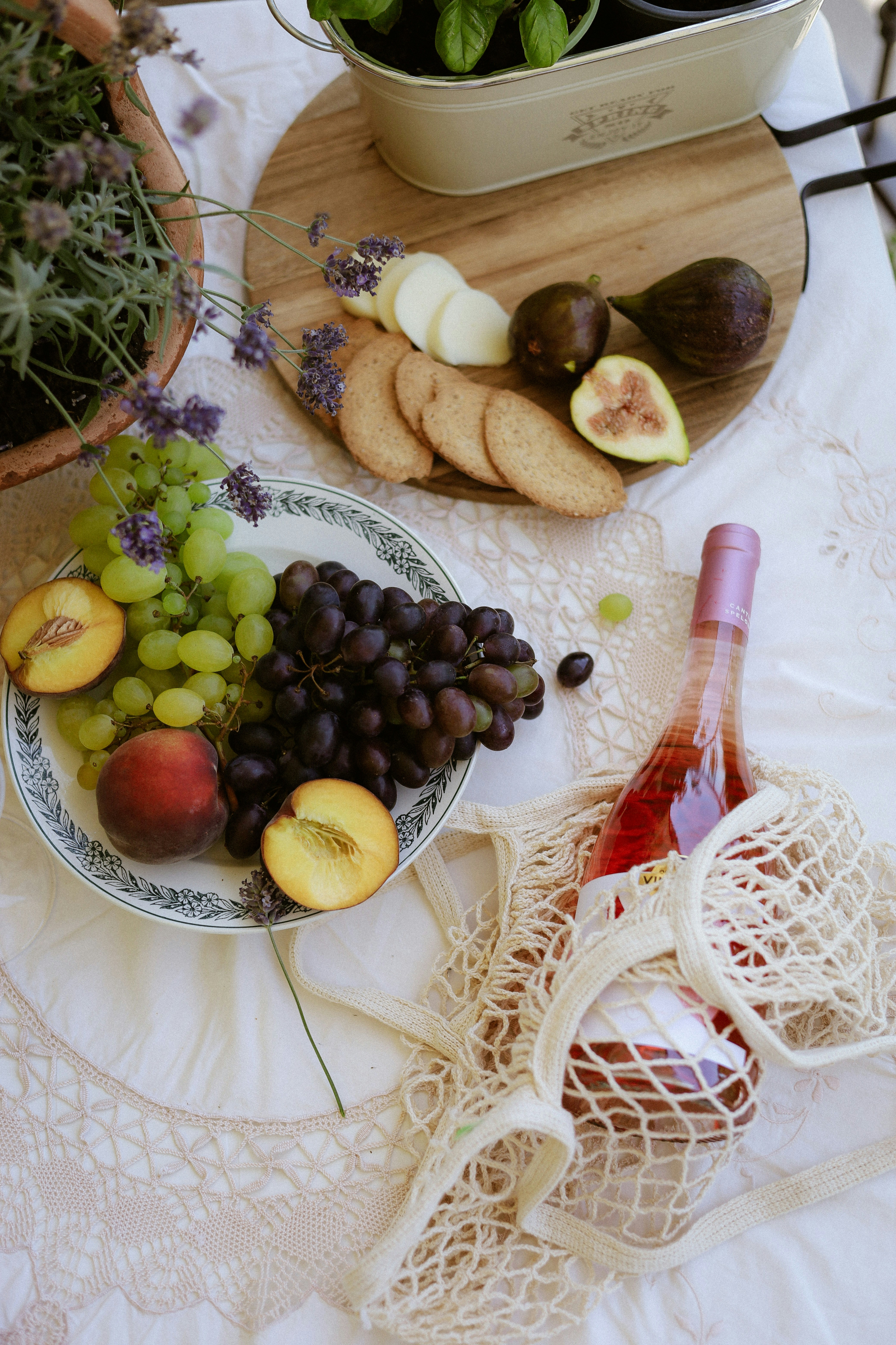 Grapes, Rosé, and Lace: A Rustic Tabletop Still-Life
