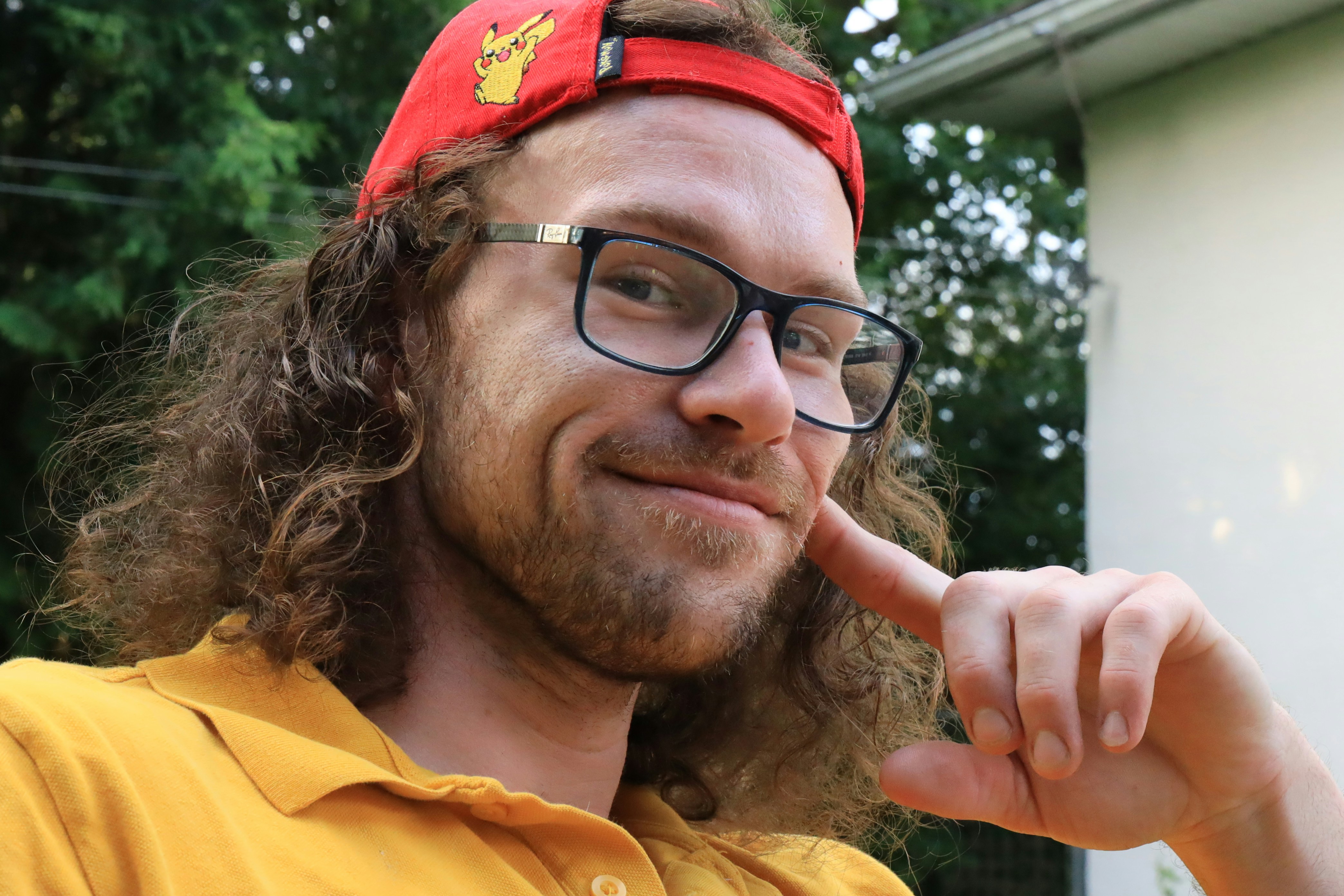 Smirk and Sunglasses: A Casual Portrait of Confidence