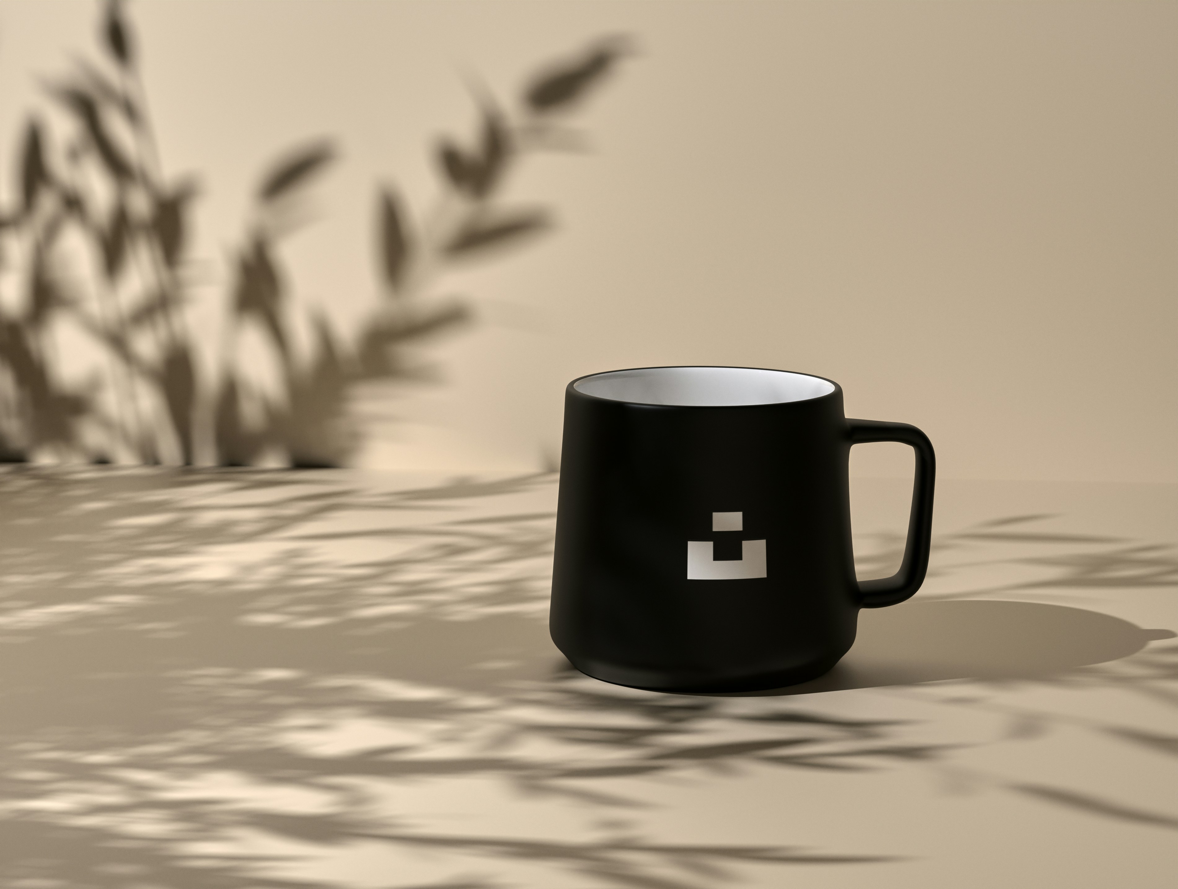 Black mug with logo against a neutral background. photo – Free Sun ...