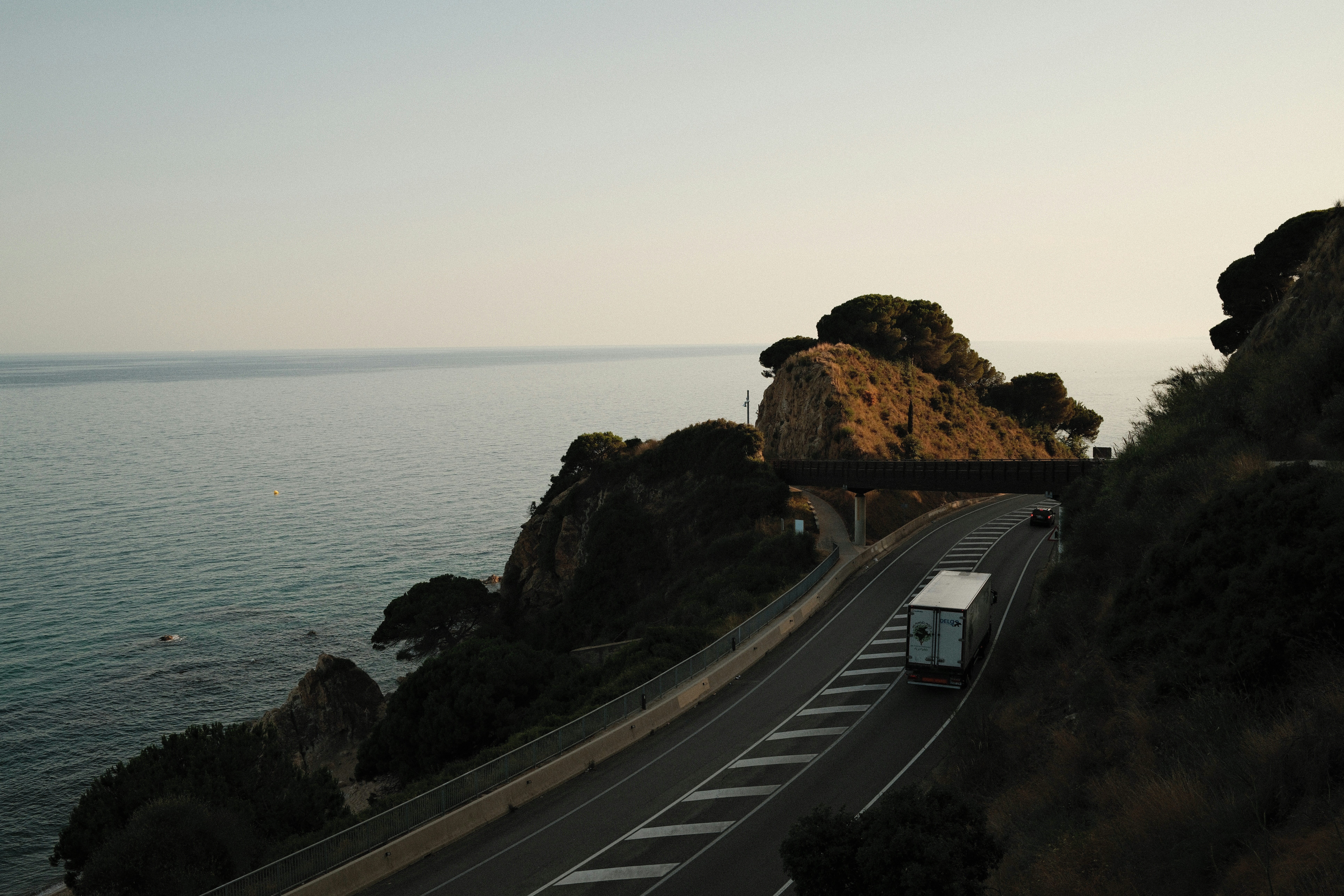 Seaside Curve: The Bus on the Cliffside Coastal Highway
