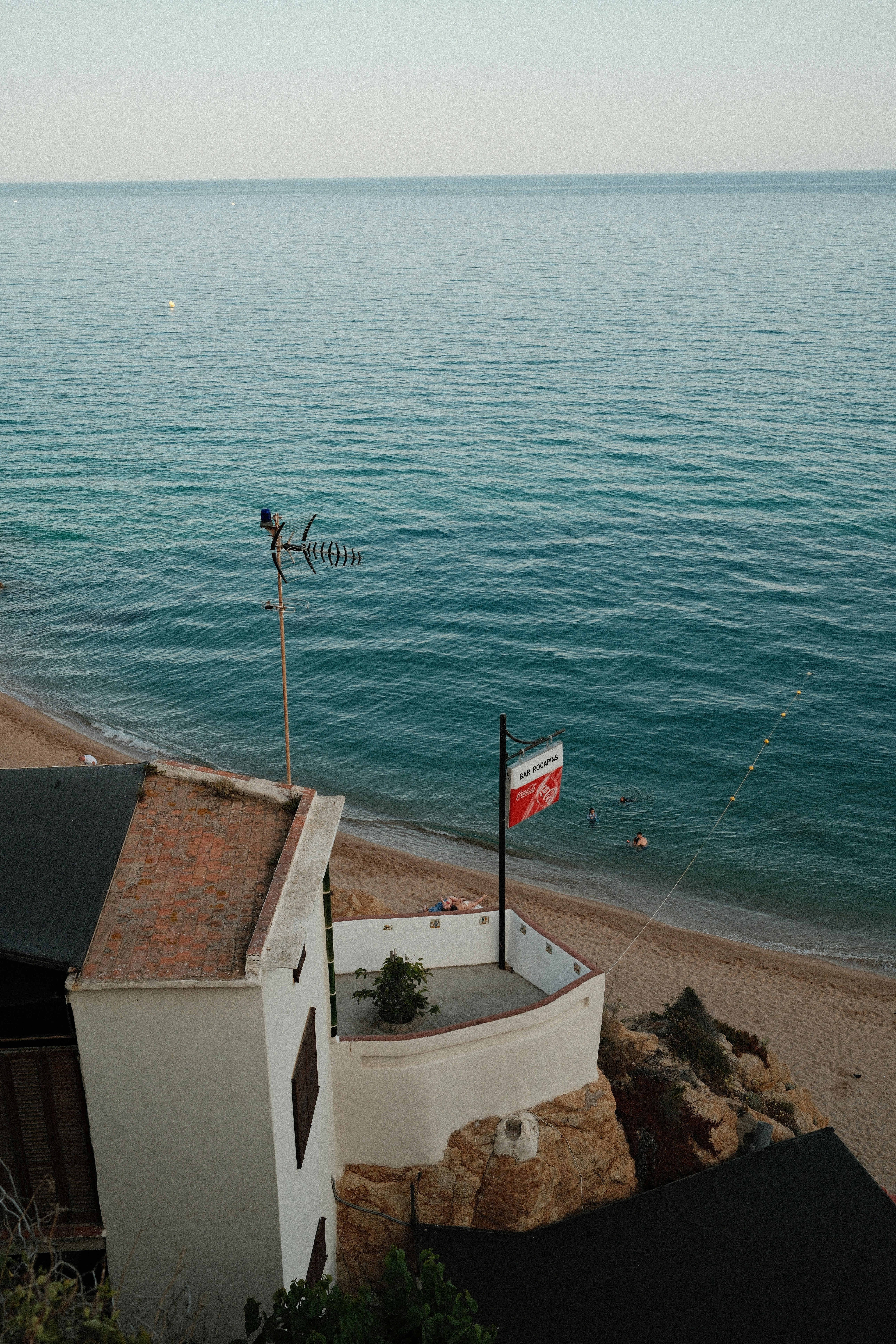 A coastal scene featuring a beach and the sea. photo – Free Beach Image ...