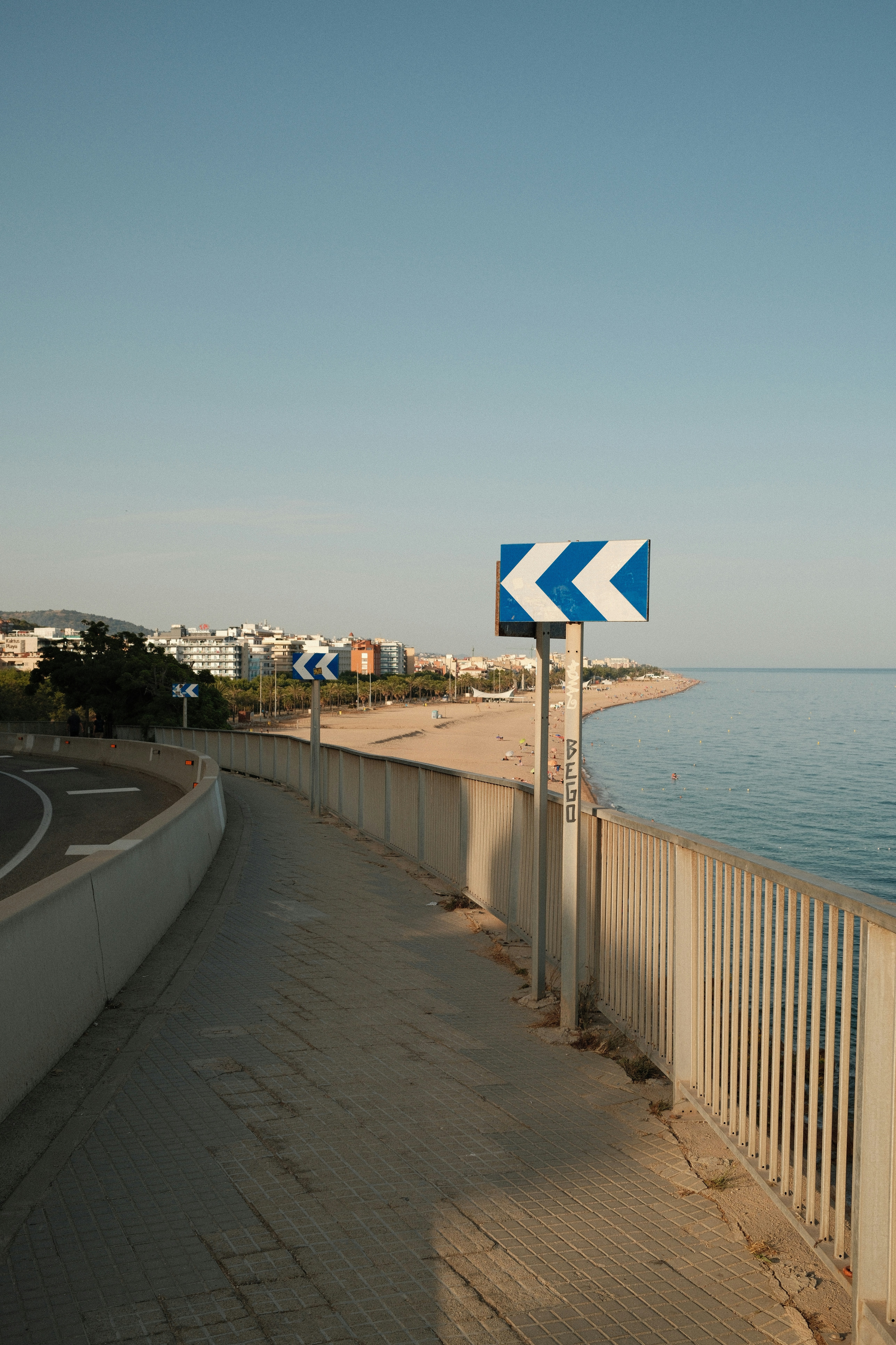 Chevron Beacons Along a Seaside Promenade