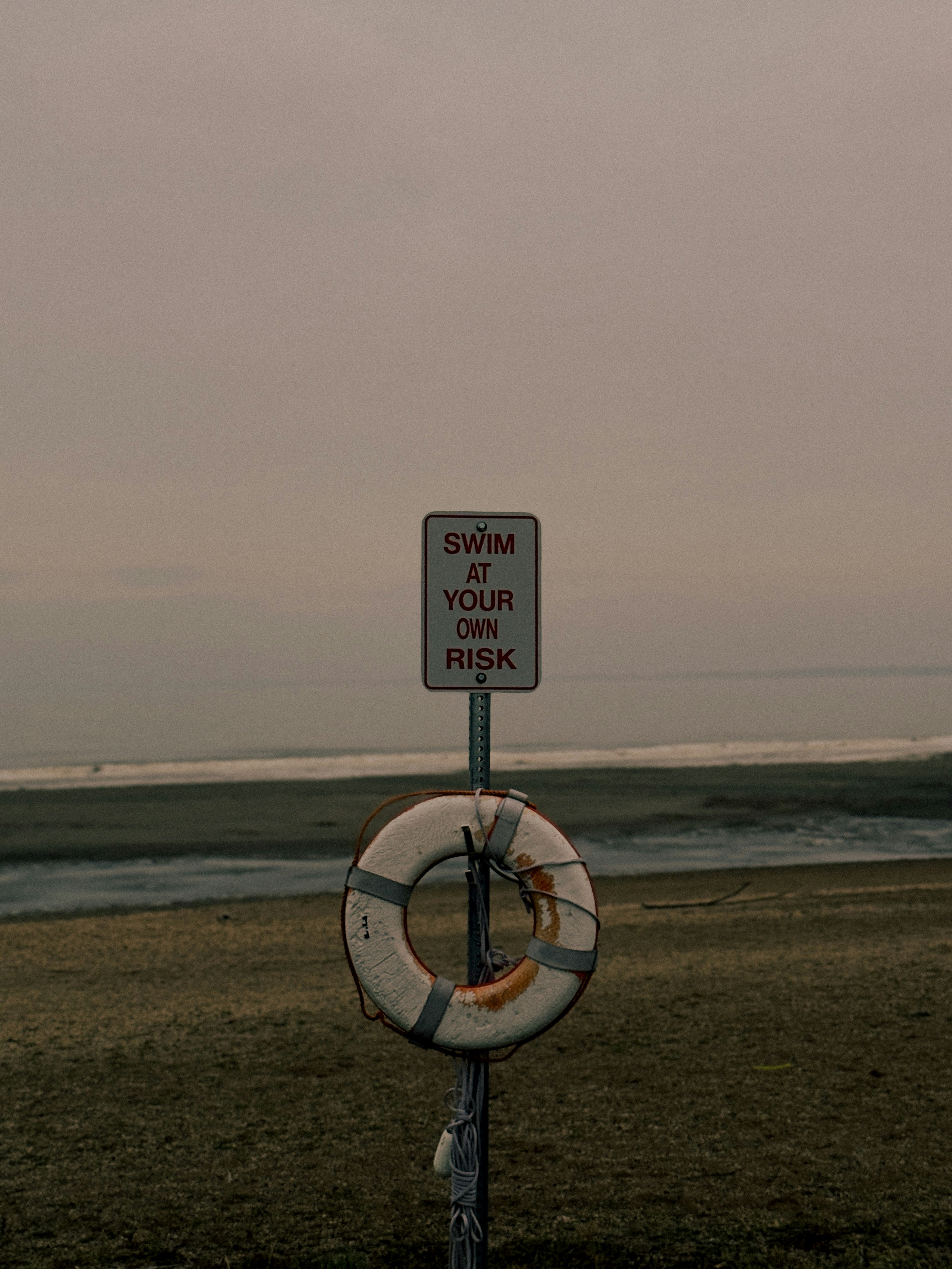 Swim at your own risk, at the seaside.