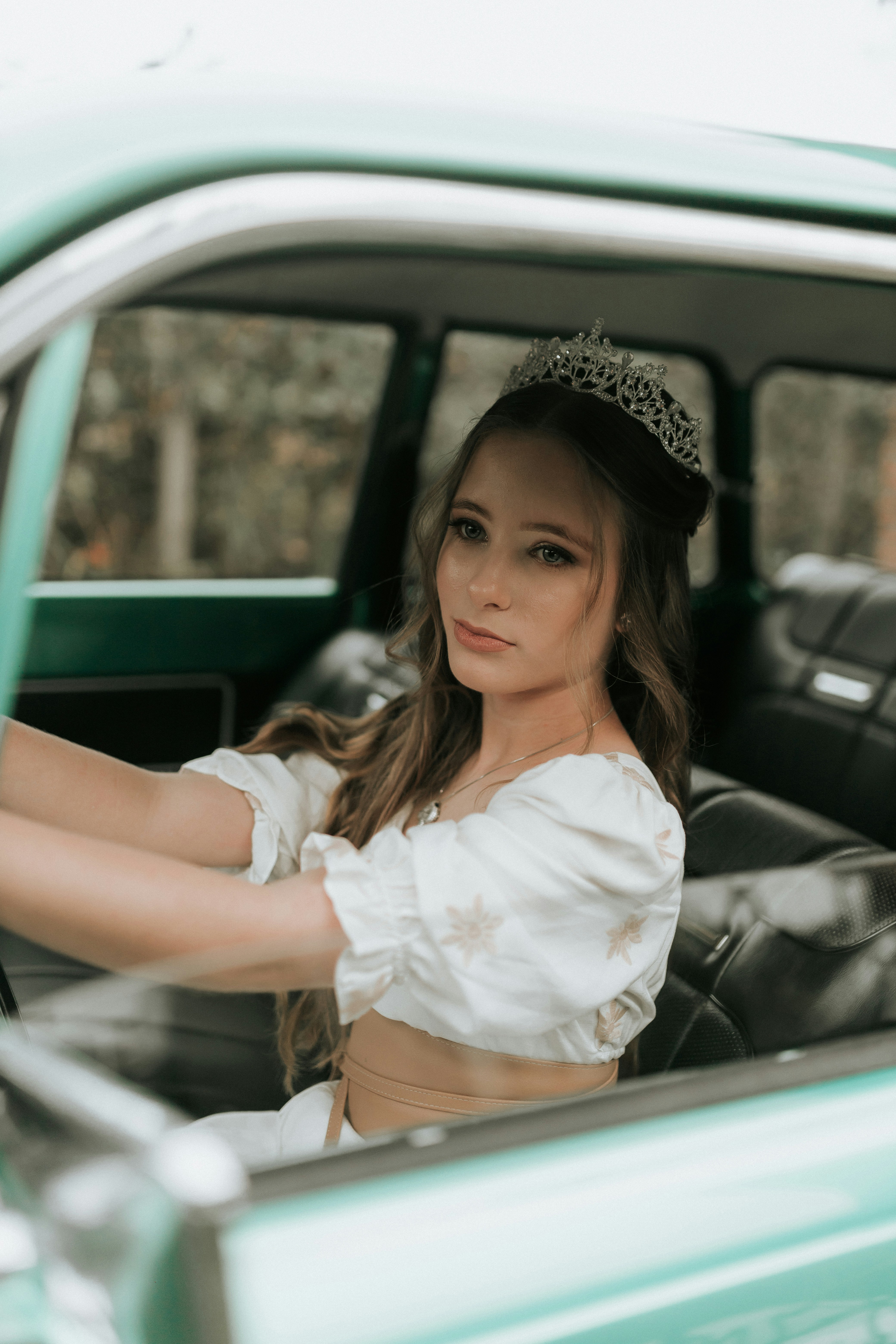 Regal Quiet in a Mint Convertible: Portrait of a Modern Princess