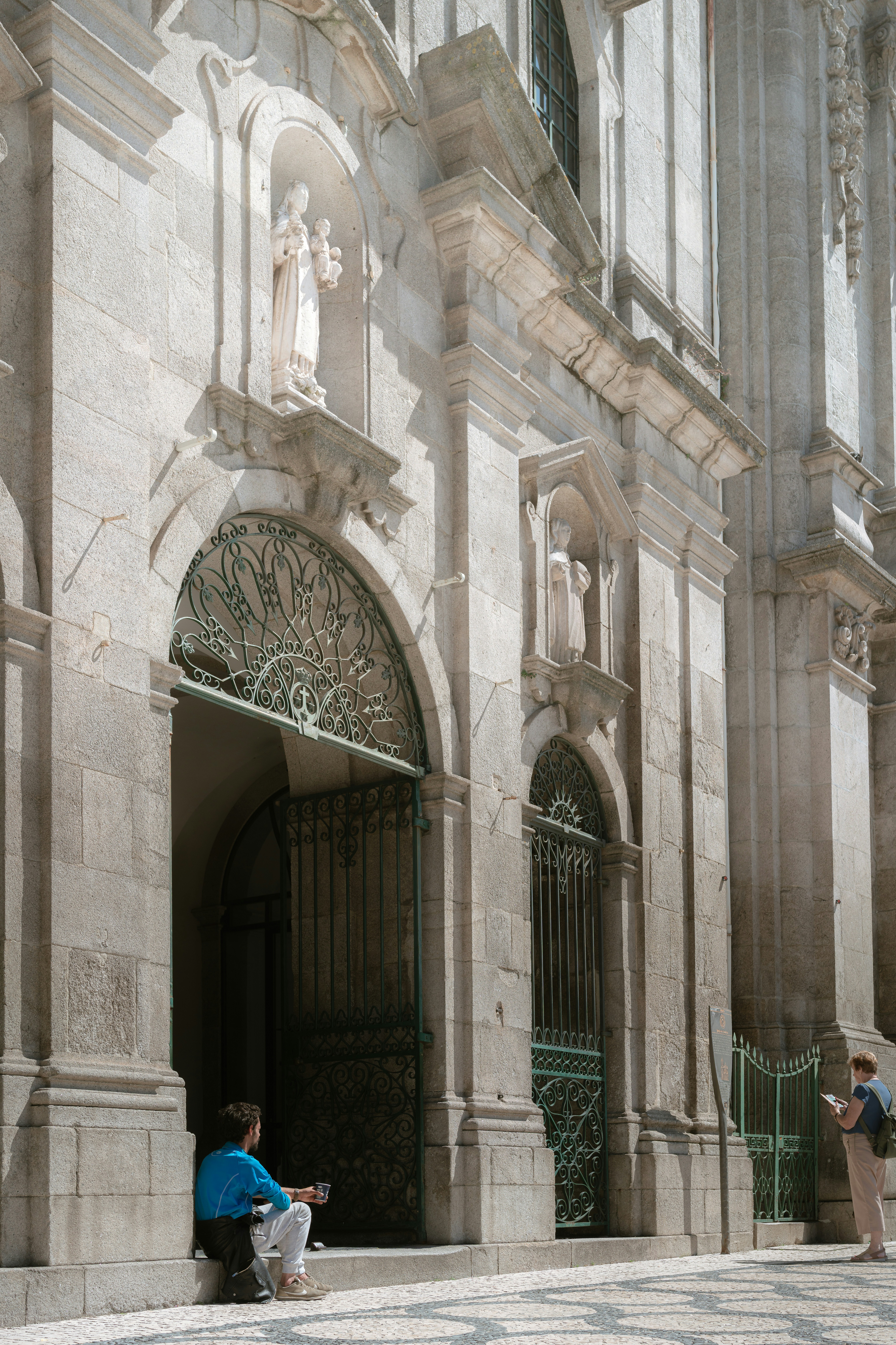 A man sits and plays music at a church.