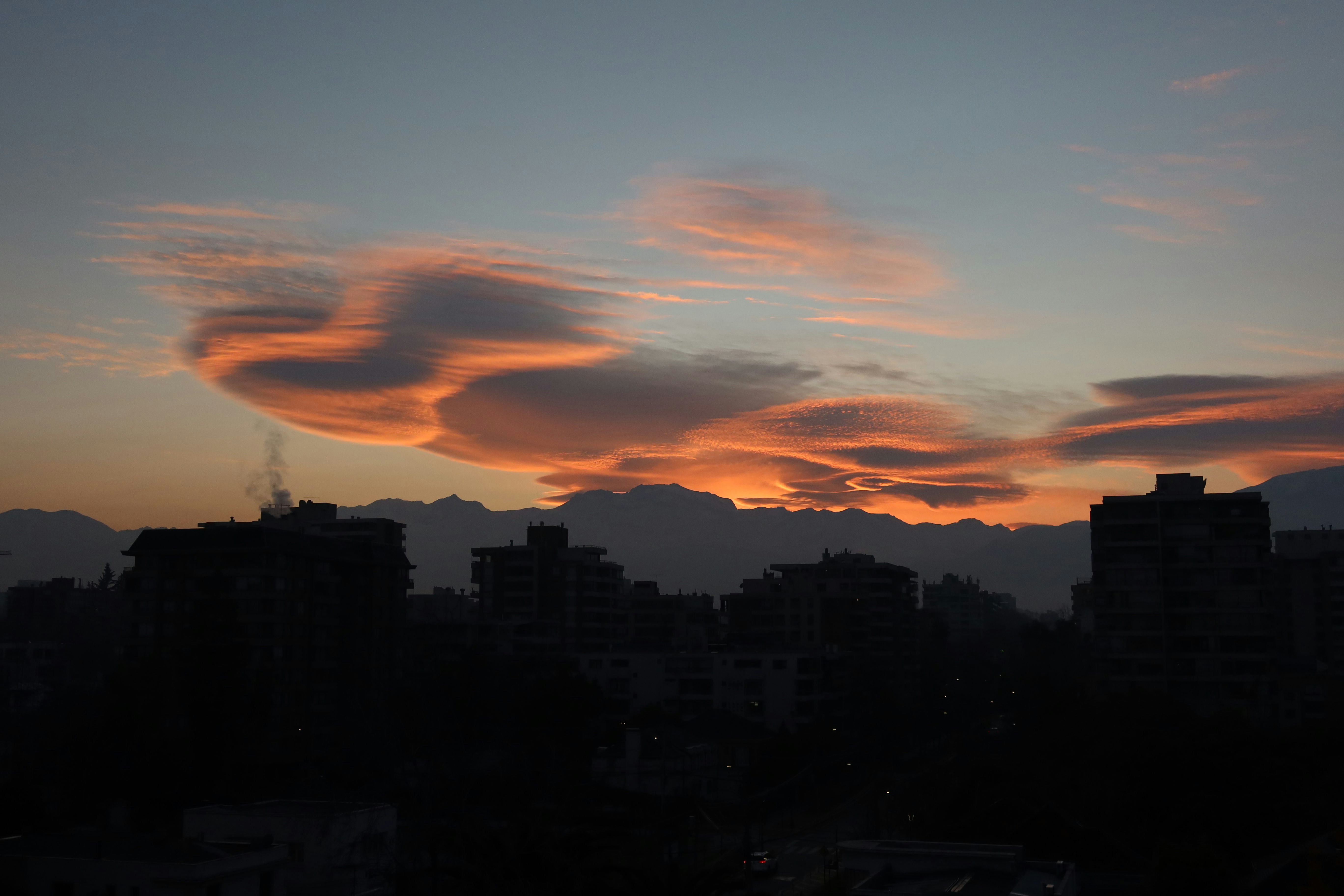 Whispers of Dawn Over Urban Peaks