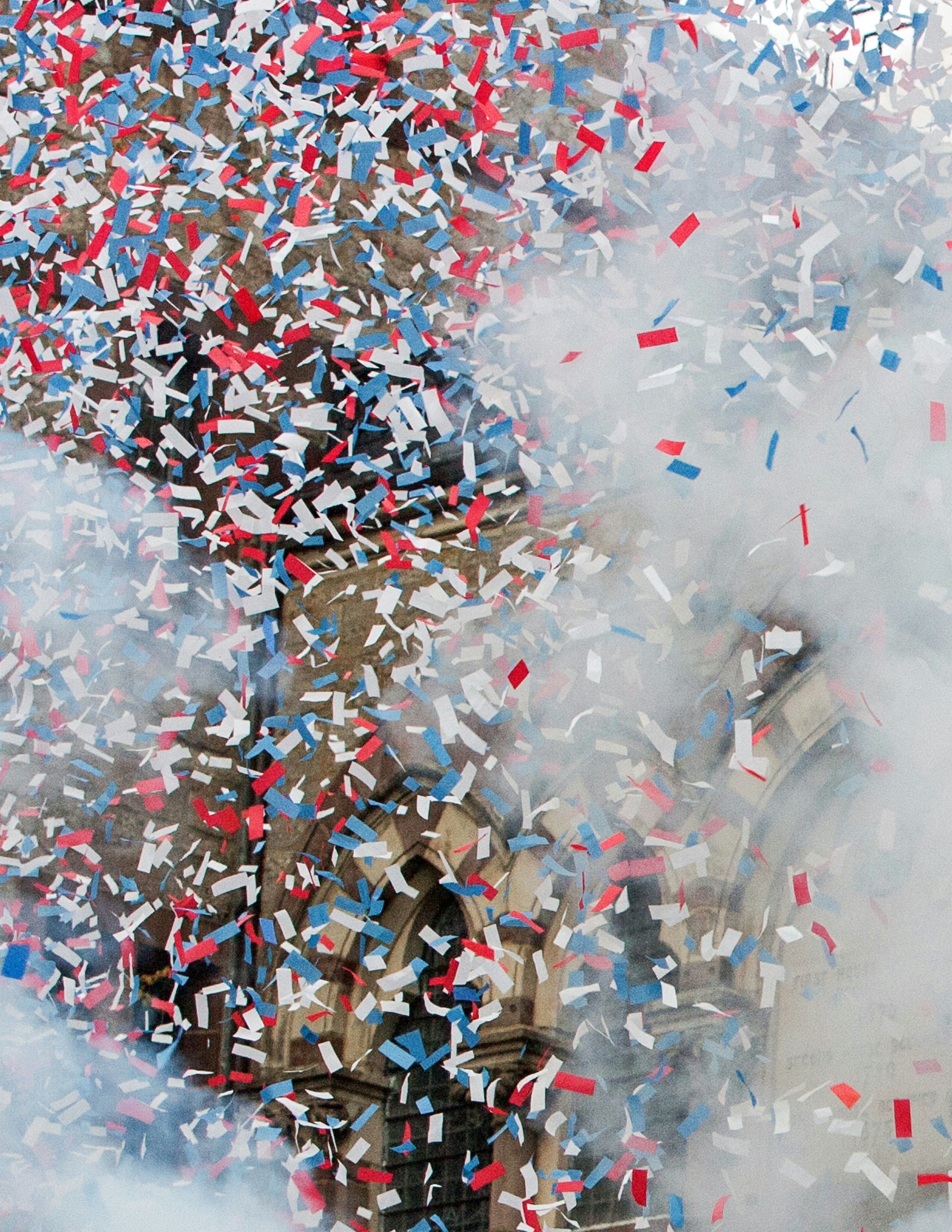 Confetti Cascade Surrounding a Winged Moment