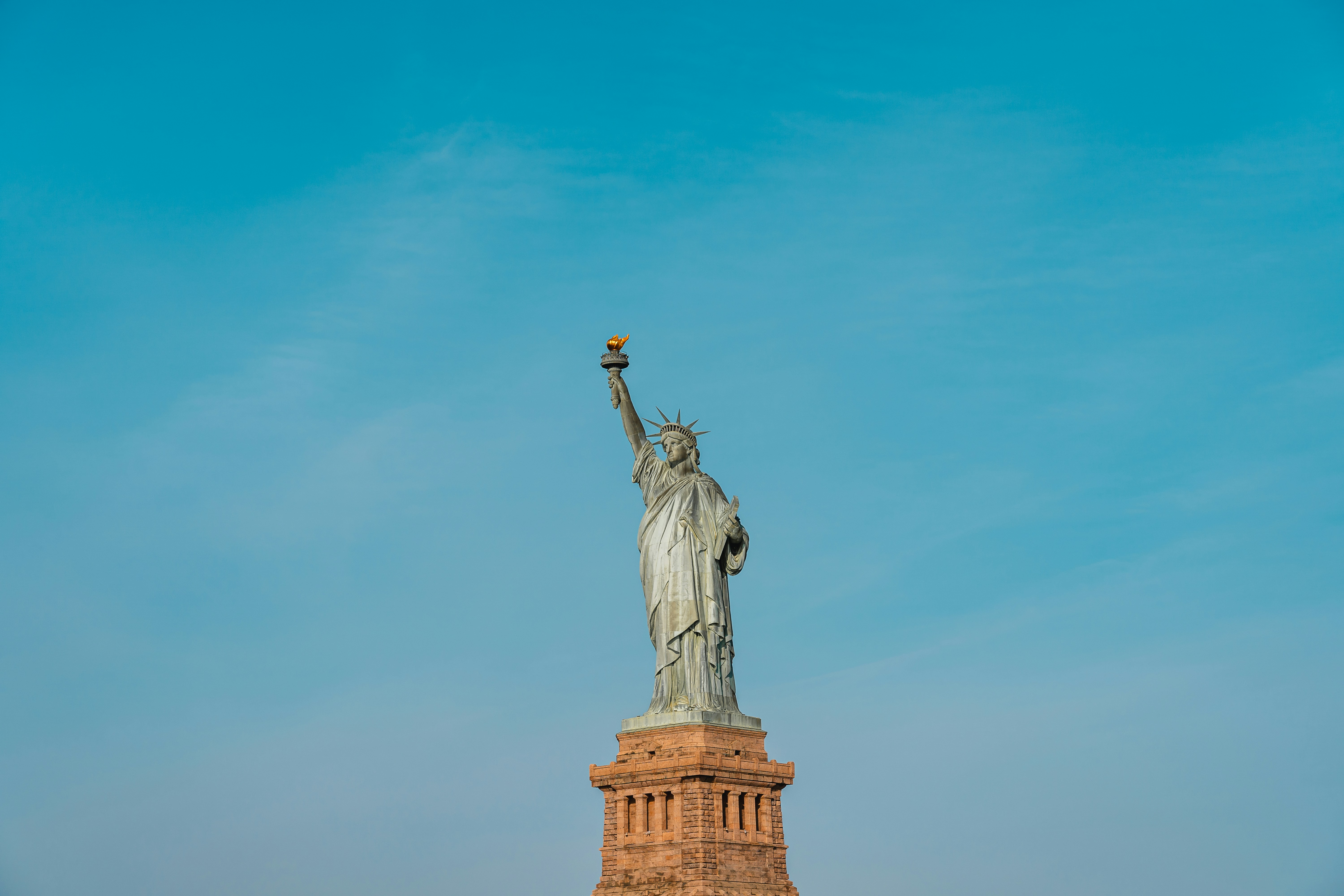 Beacon of Freedom Against a Serene Sky