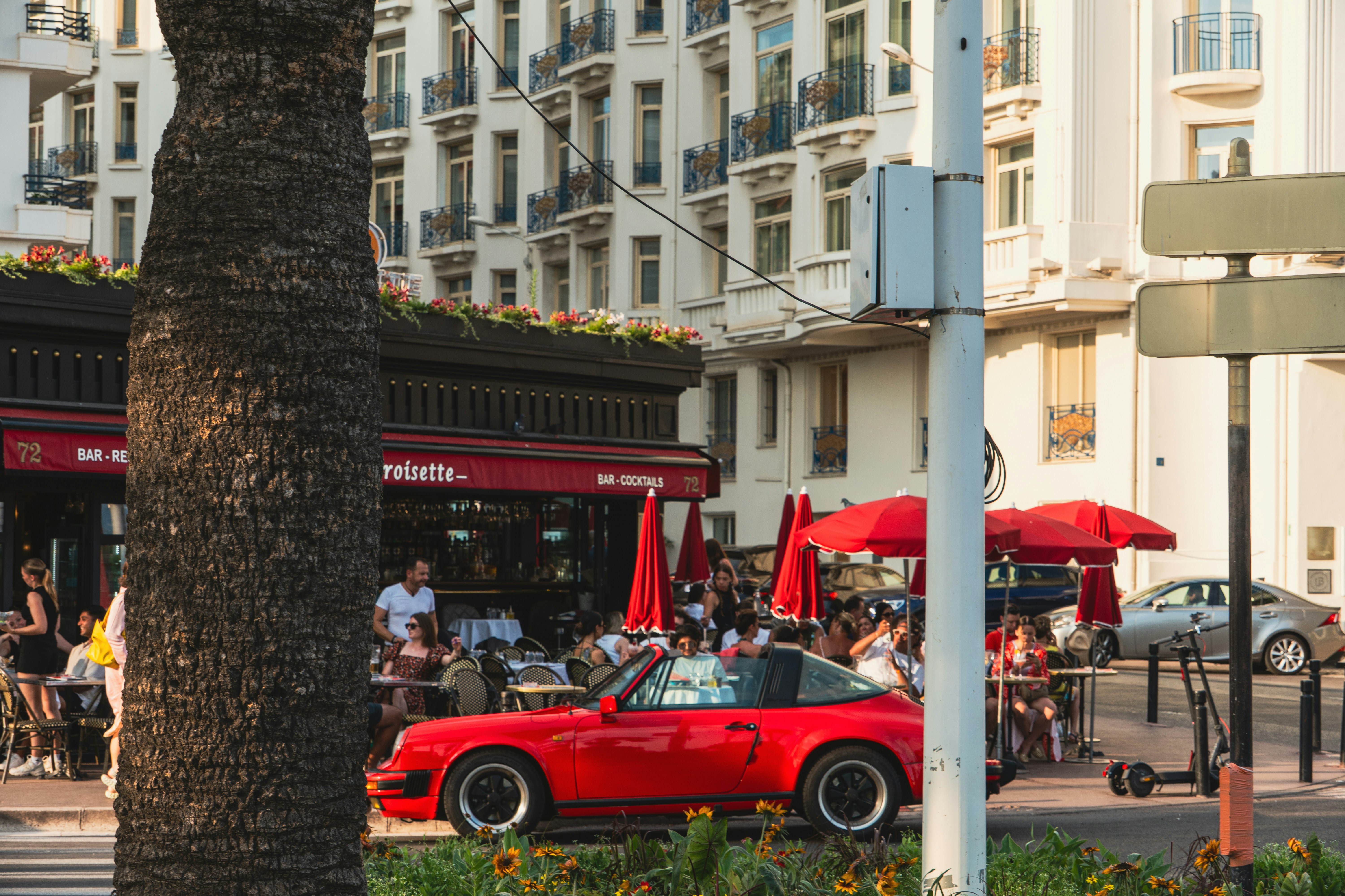 Red Convertible on a Sunny Boulevard Afternoon