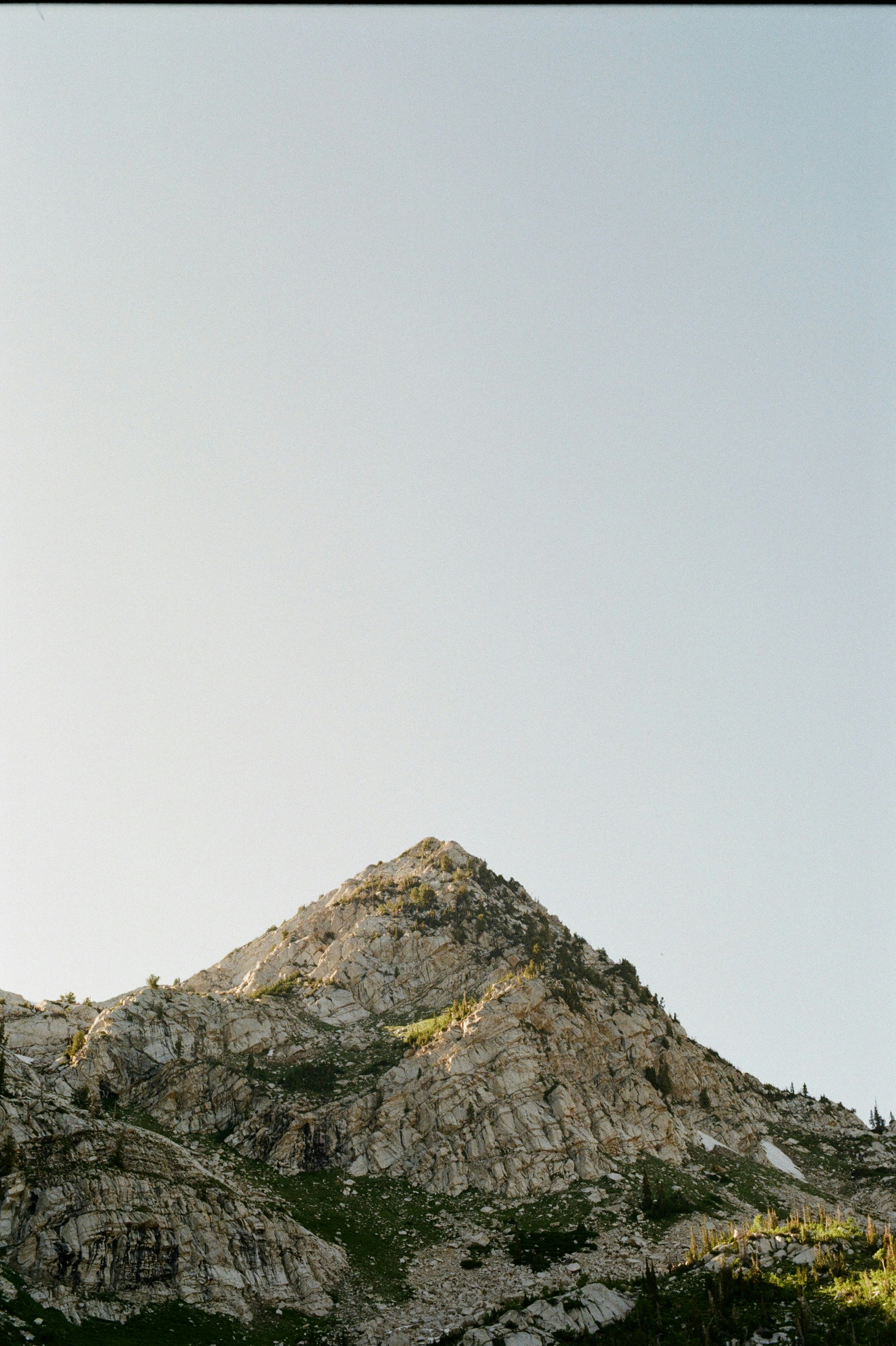 Canon A-1 on Fuji 200 | A mountain peak reaches for the clear sky.