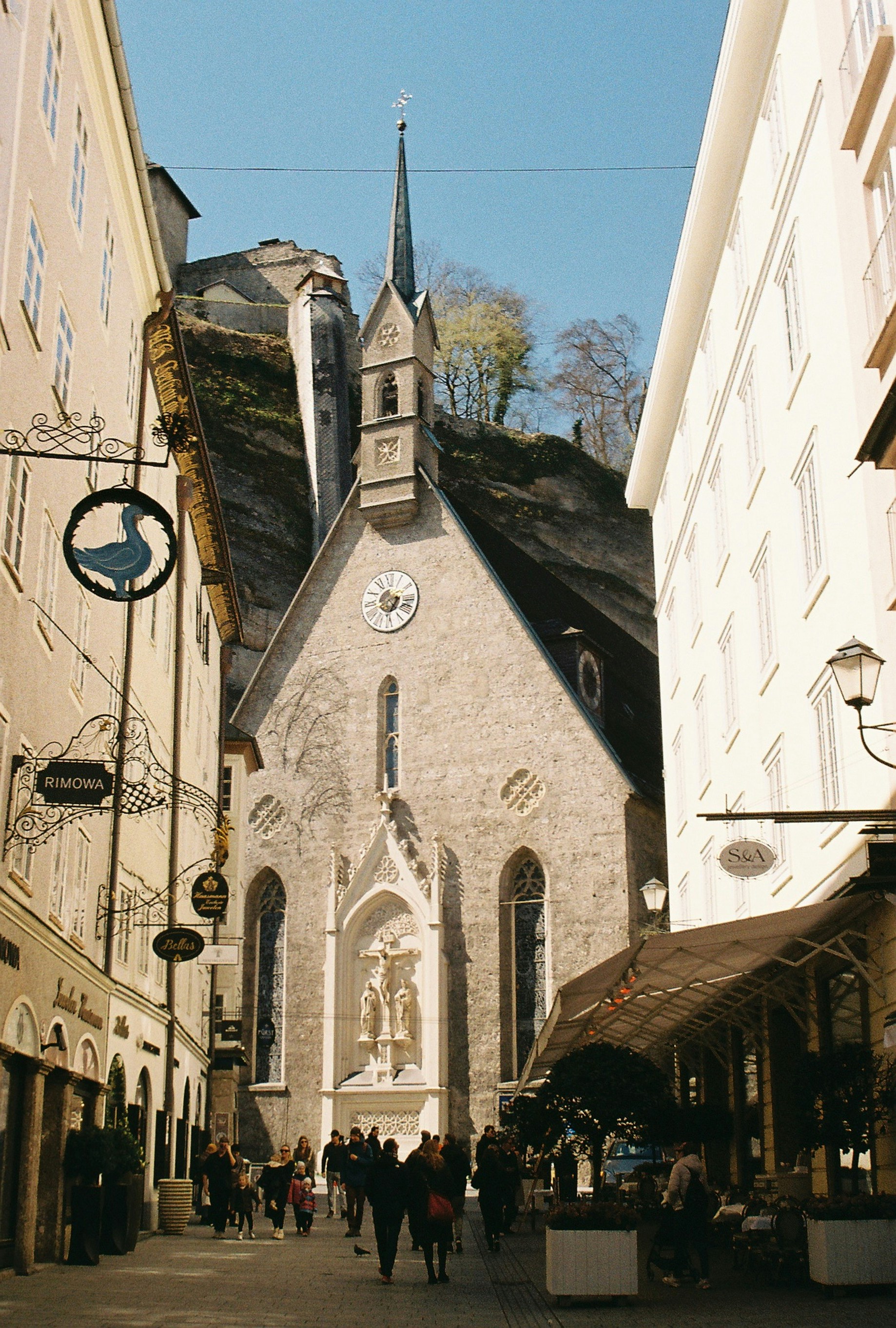 A church stands on a european street.