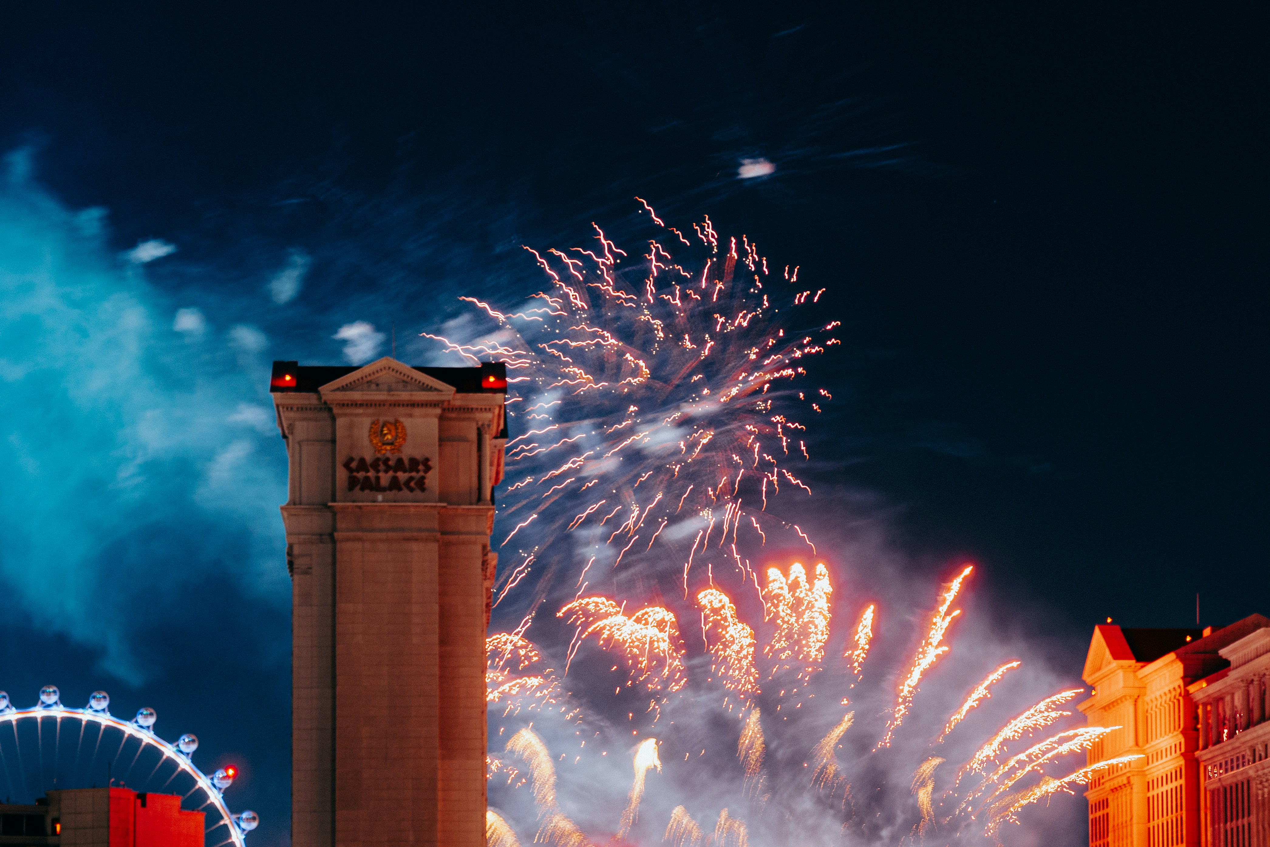 Fireworks illuminate the night sky over a landmark. photo – Free Night ...