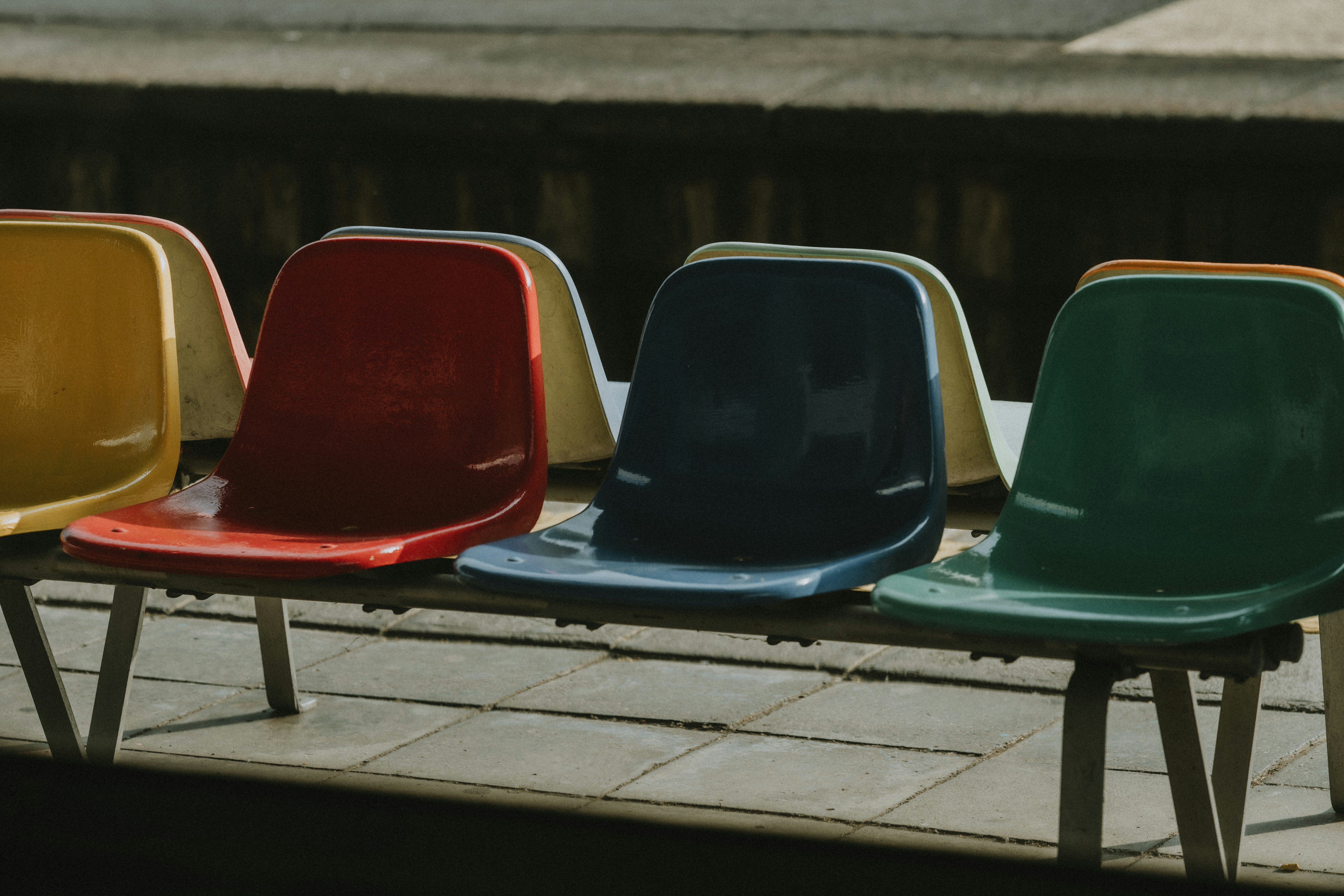 Colorful chairs in a row. photo – Free Furniture Image on Unsplash