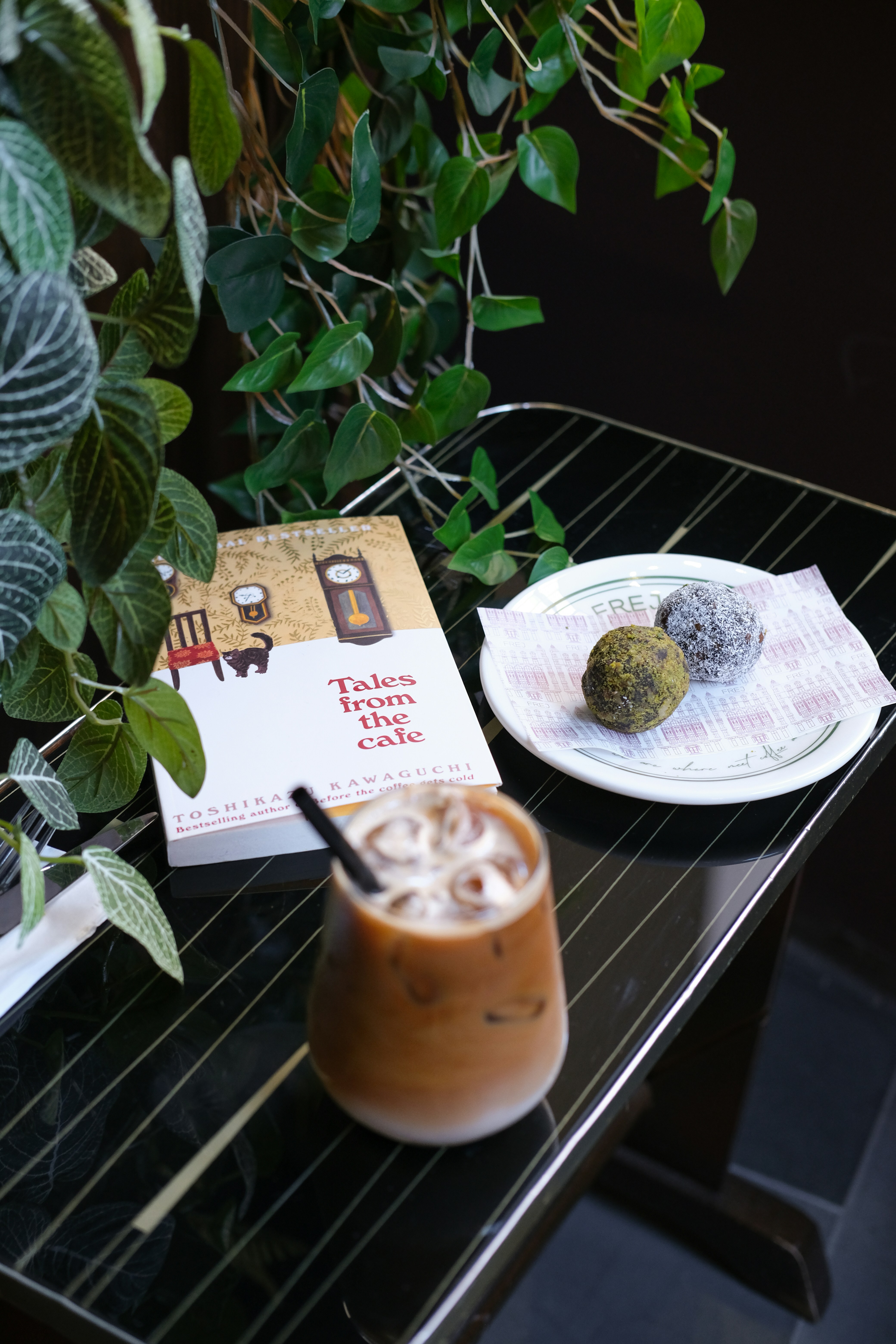 Coffee, snacks, and a book create a cozy café scene. photo – Free Food ...