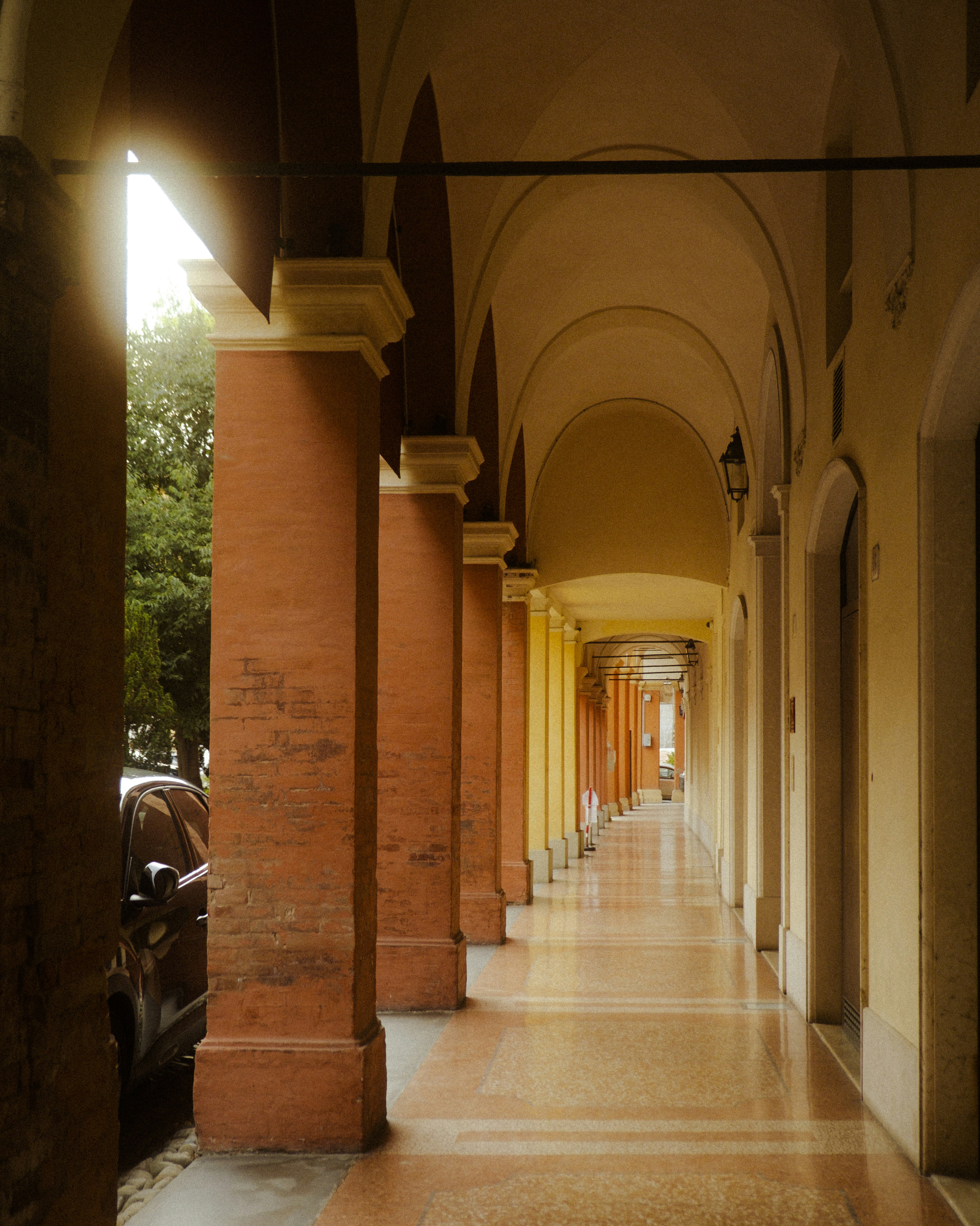A long, beautiful archway with columns.