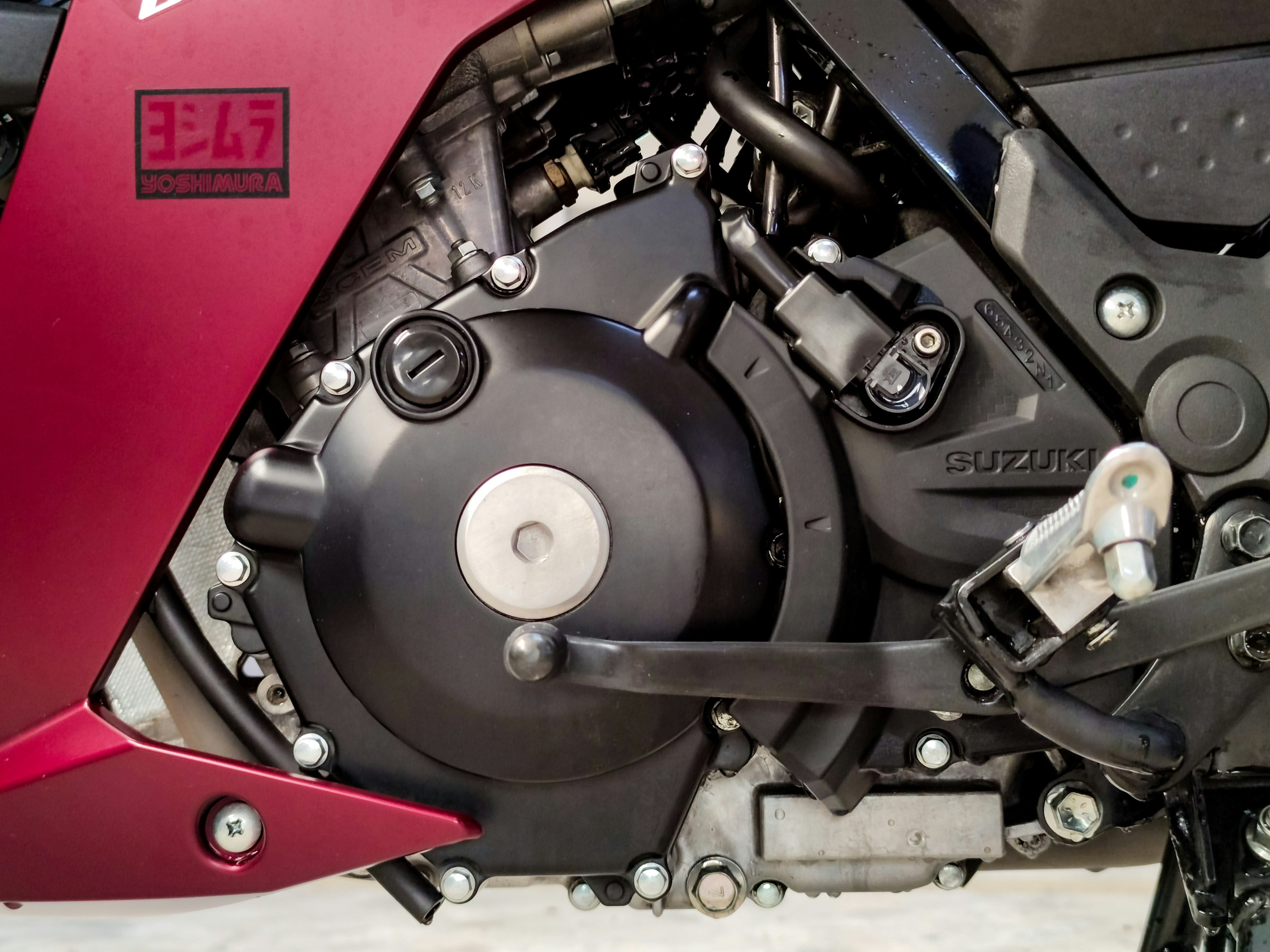 Detailed view of a motorcycle engine showcasing intricate components and design. This illustration highlights the mechanical sophistication of modern motorcycles.