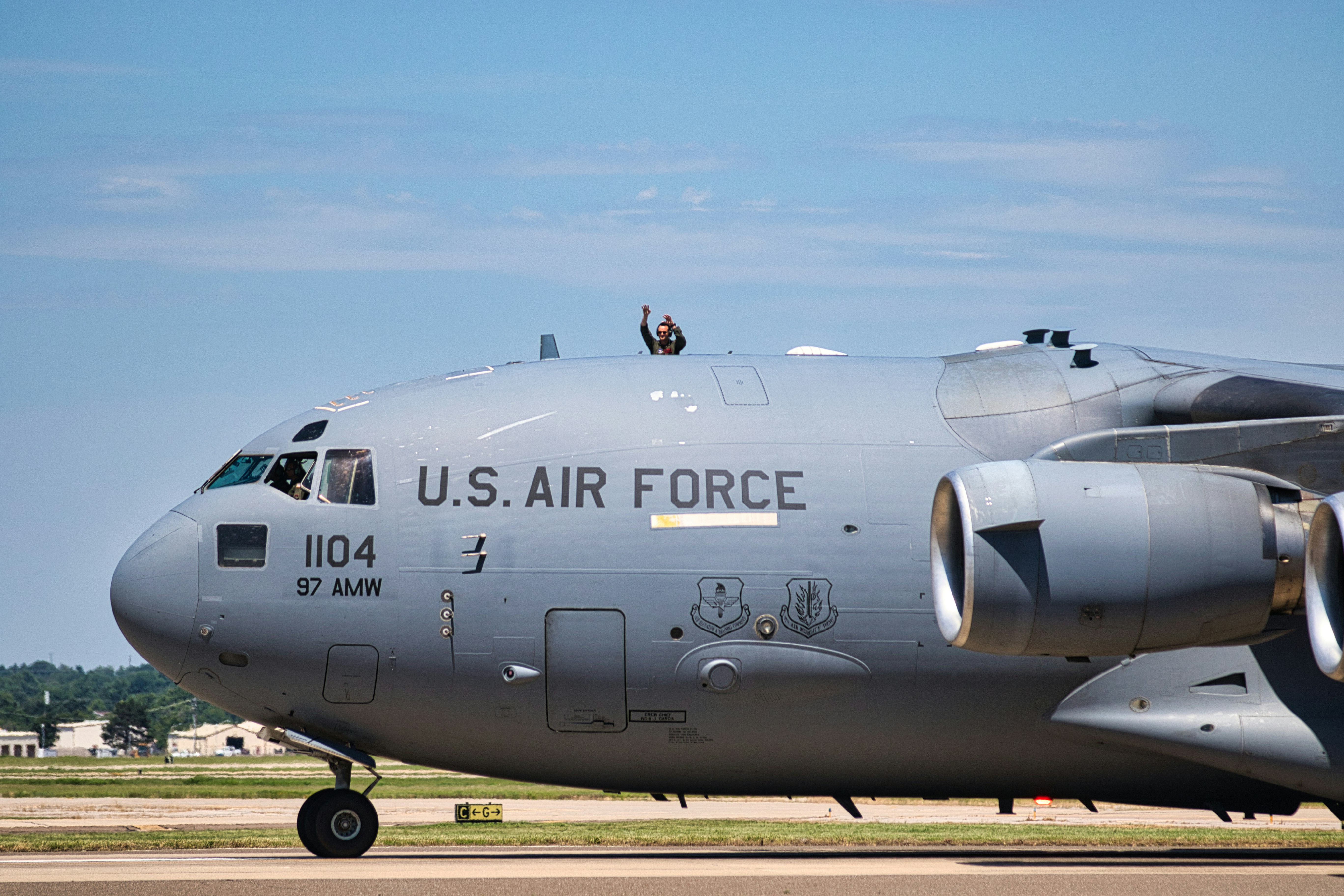 A u.s. air force cargo plane sits on the runway. photo – Free Airplane ...