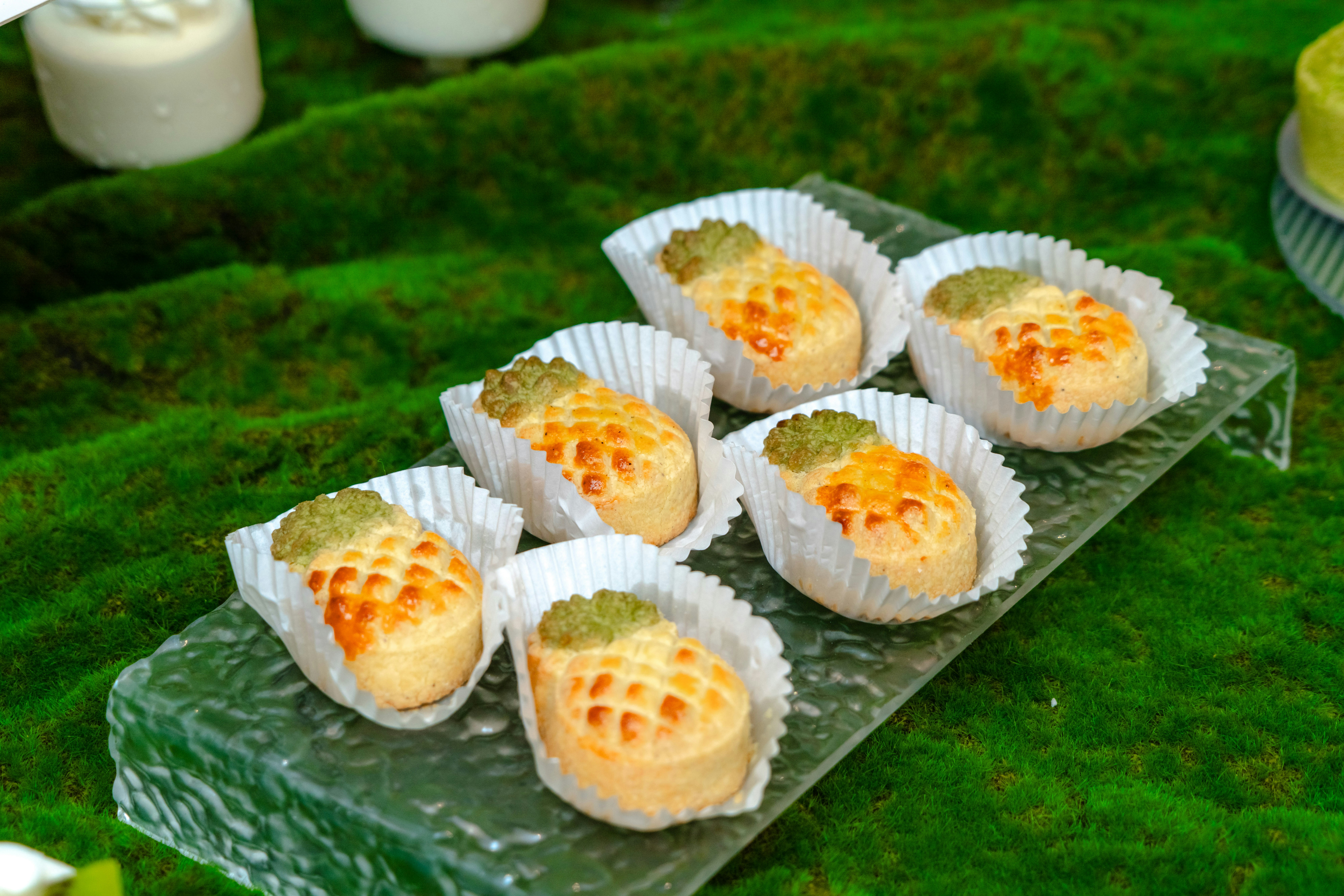 Delicate Confections on a Verdant Canvas