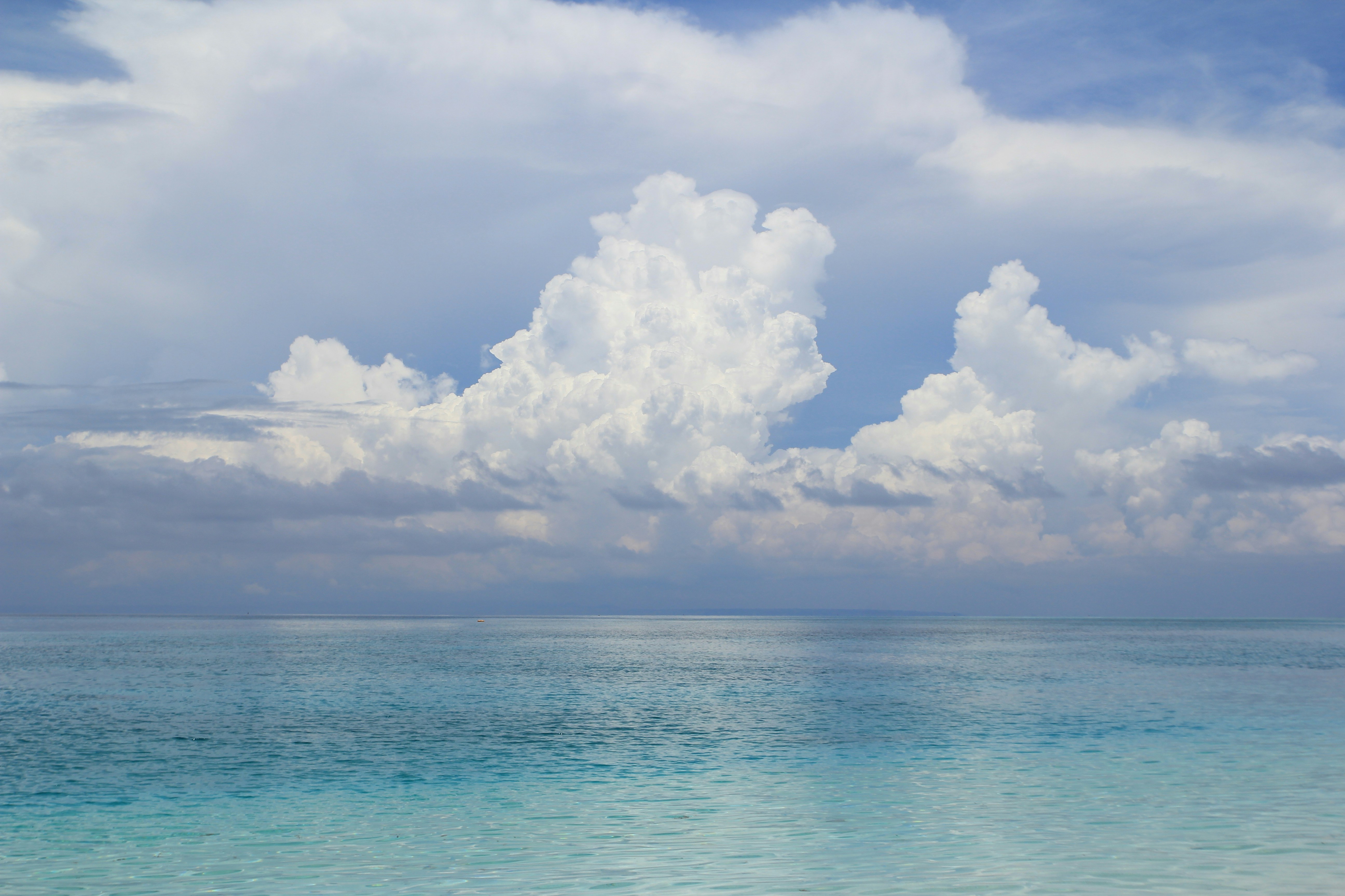 Cloud Cathedral Over Turquoise Seas