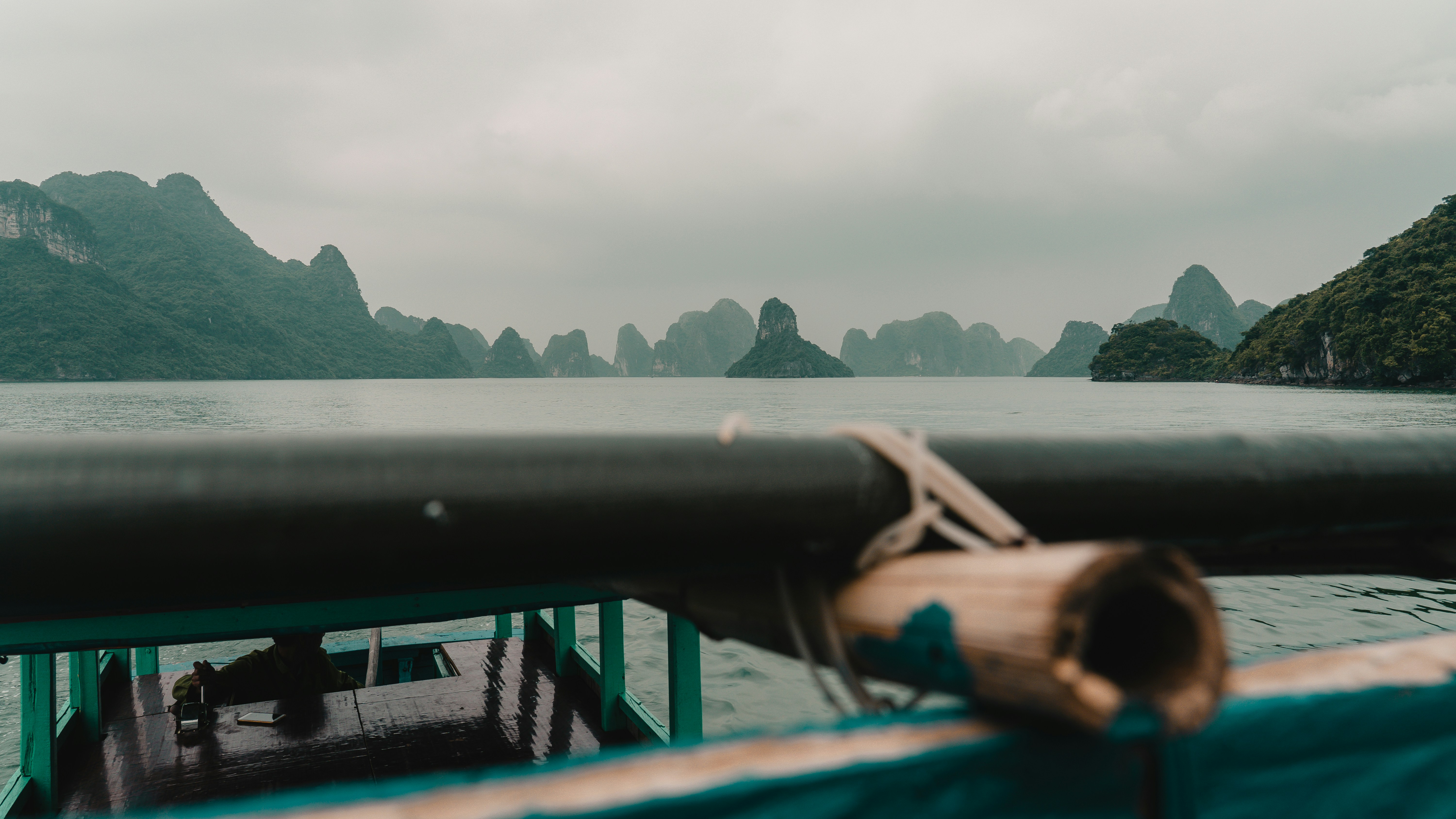 Mountains and water seen from a boat.