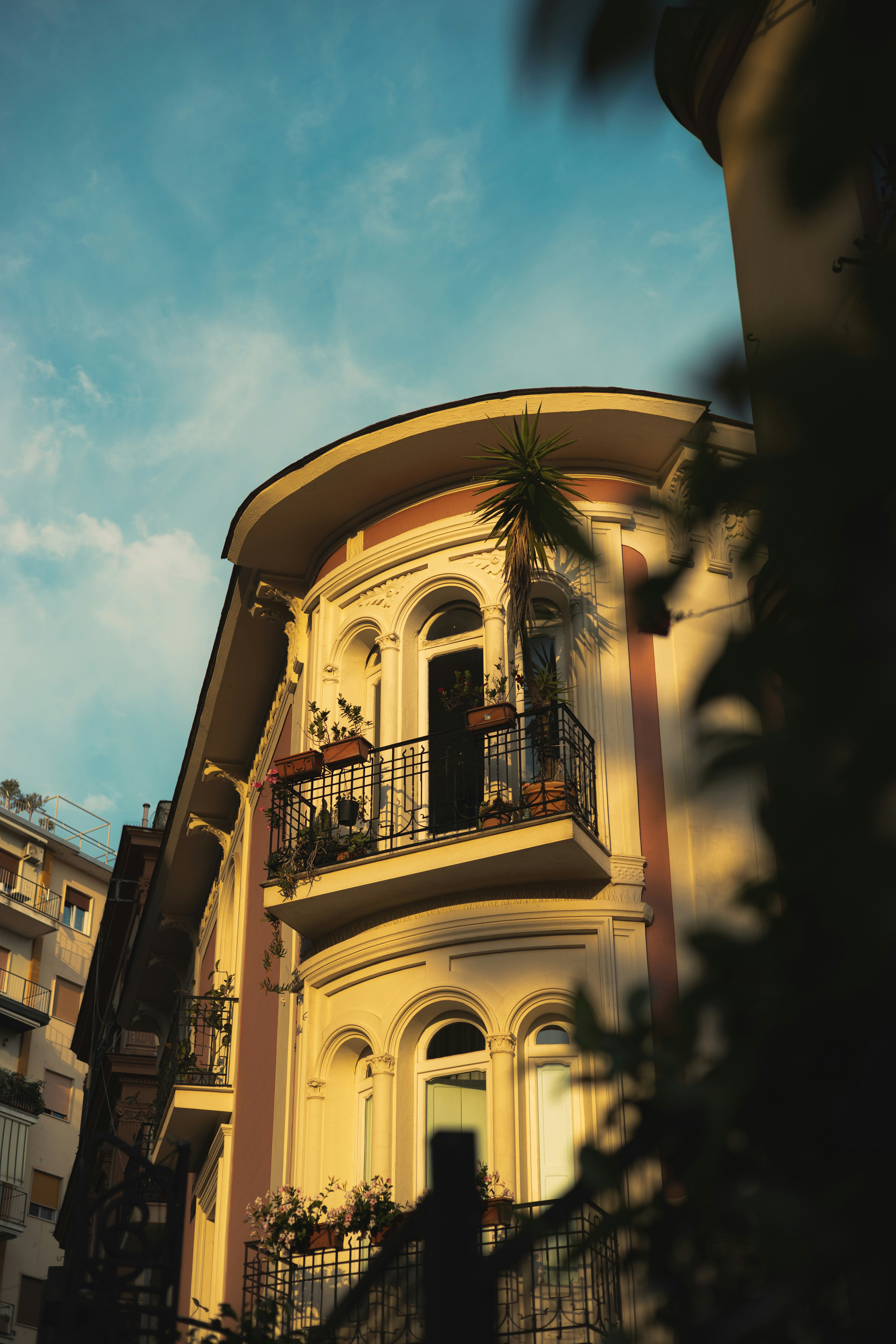 Beautiful, old building with arched windows and balconies.