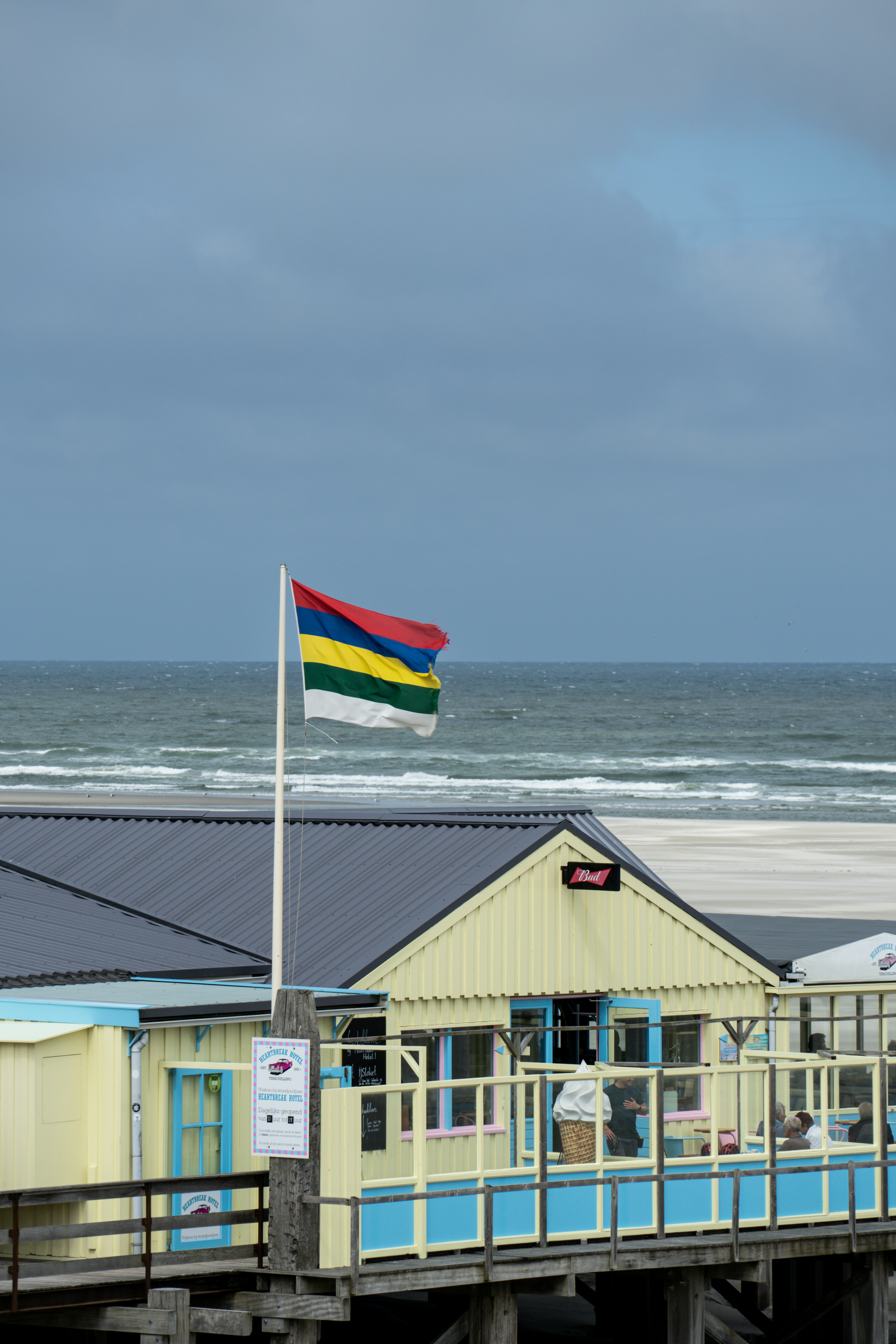 Vibrant Coastal Retreat Under a Cloudy Sky