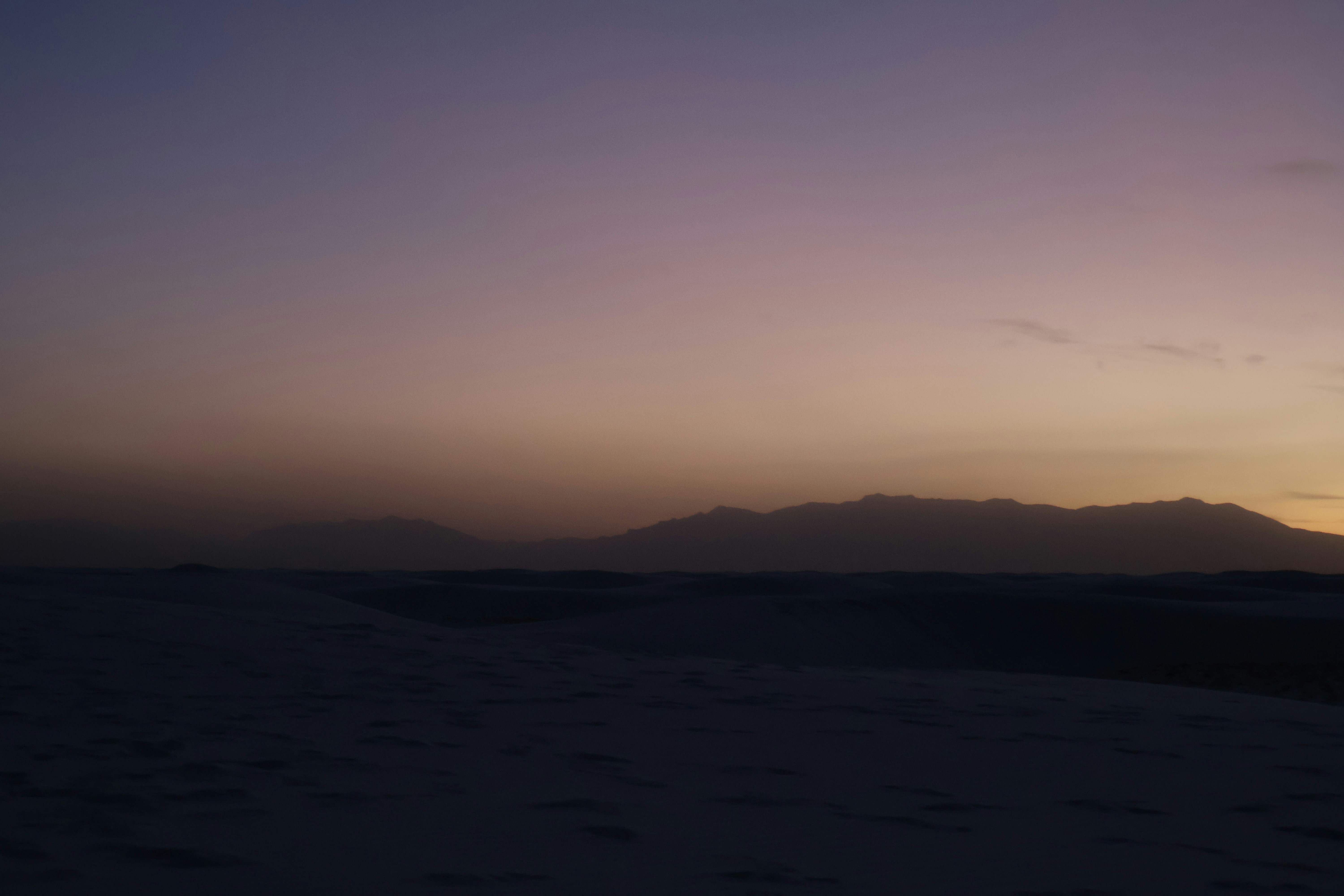 Whispers of Dusk Over Distant Peaks