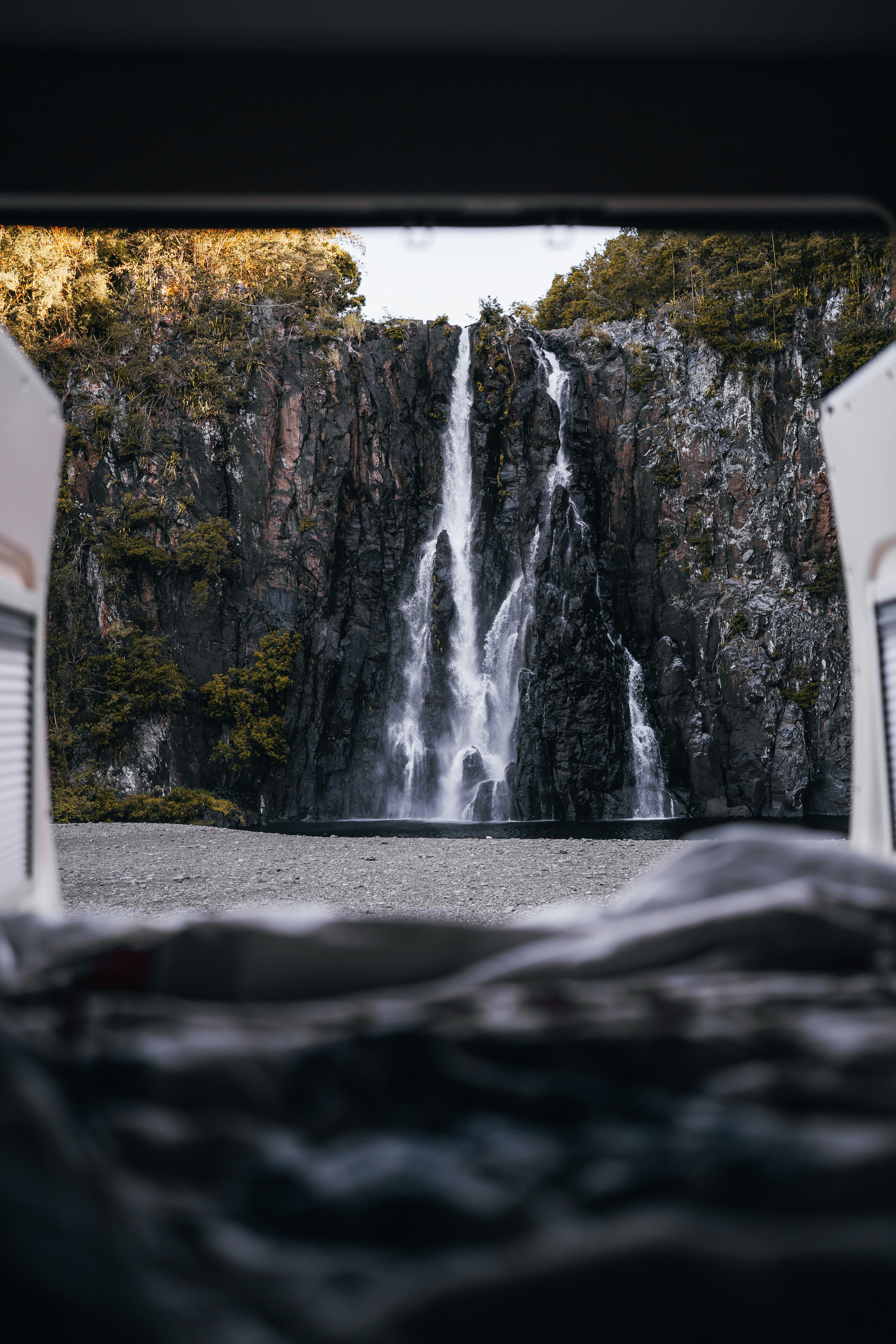 Waterfall View from Within a Vanlife Frame