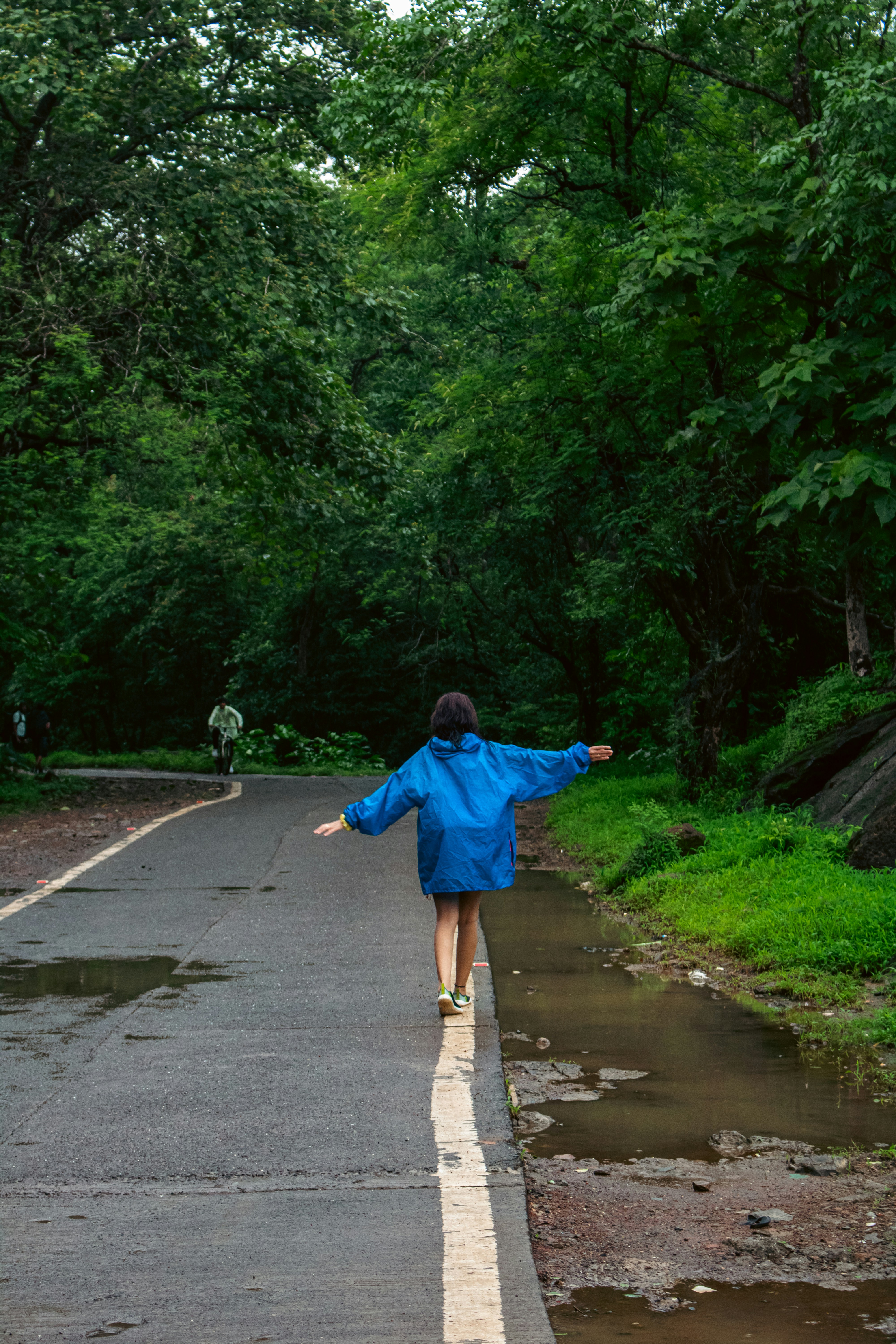 Balancing Act on a Rainy Path